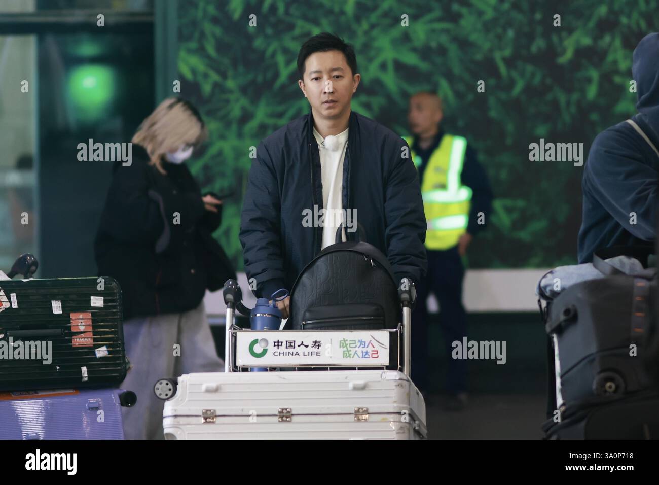 Chinese Mandopop singer and actor Han Geng appears at airport in ...