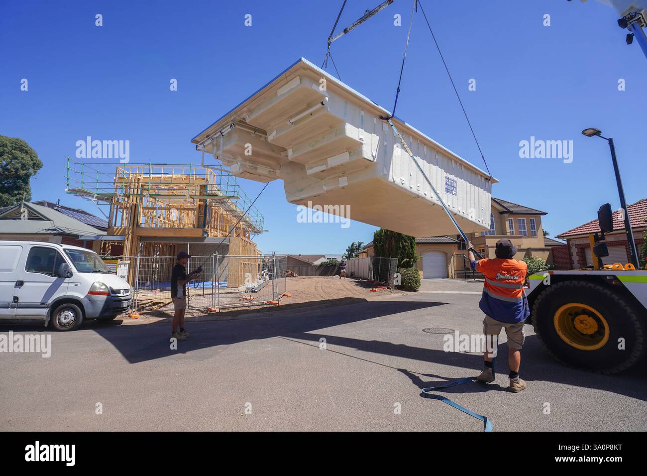 Adelaide, Australia 5 March 2025. A crane lifting a fiberglass swimming ...