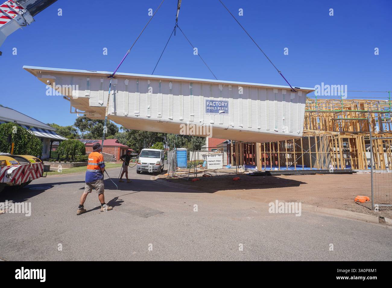 Adelaide, Australia 5 March 2025. A crane lifting a fiberglass swimming ...