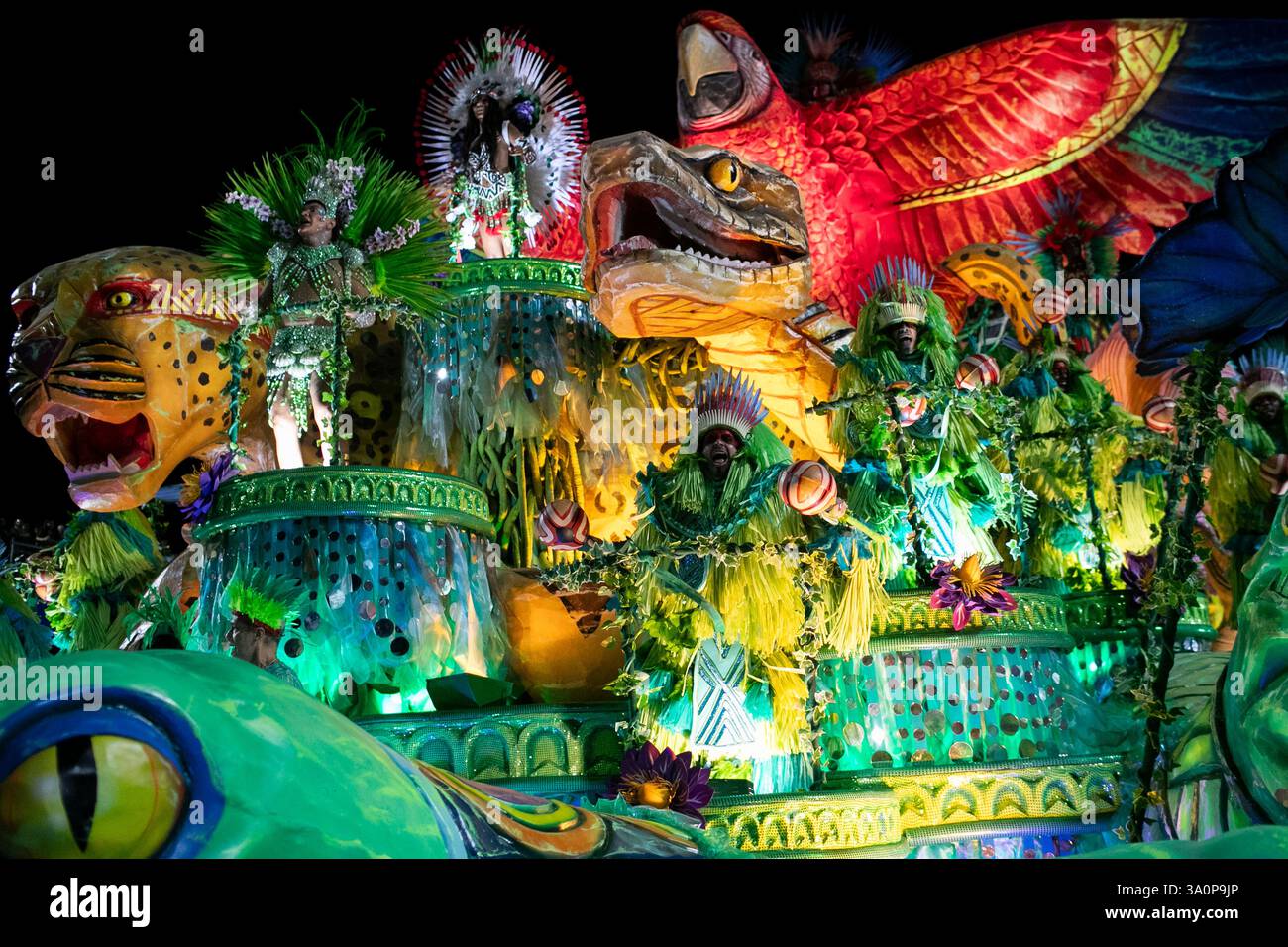 Performers from the Grande Rio samba school parade on a float during ...