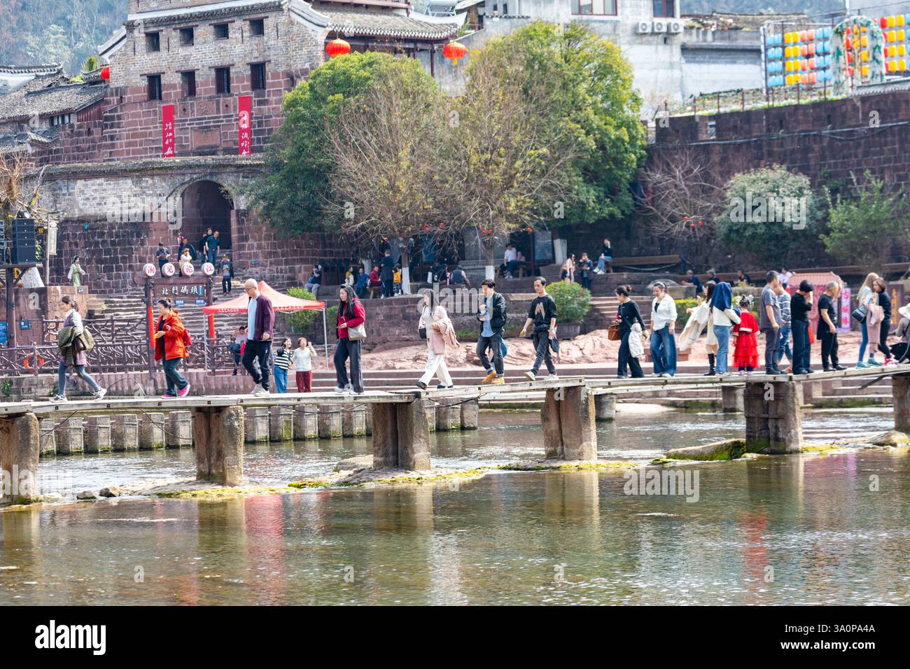 Tourists admire spring flowers in Xiangxi Tujia and Miao Autonomous ...