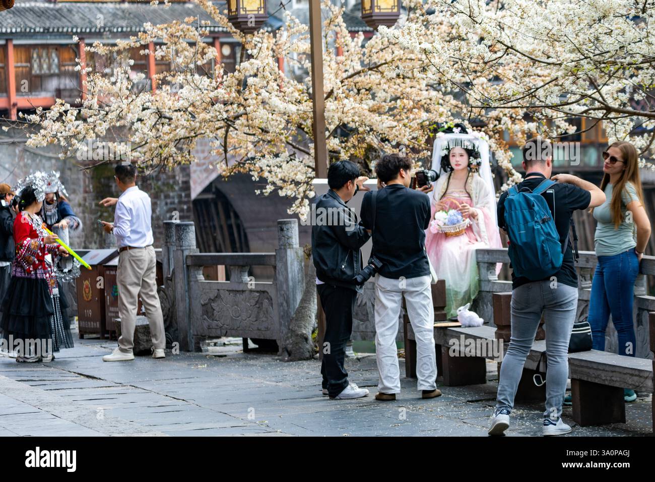 Tourists admire spring flowers in Xiangxi Tujia and Miao Autonomous ...