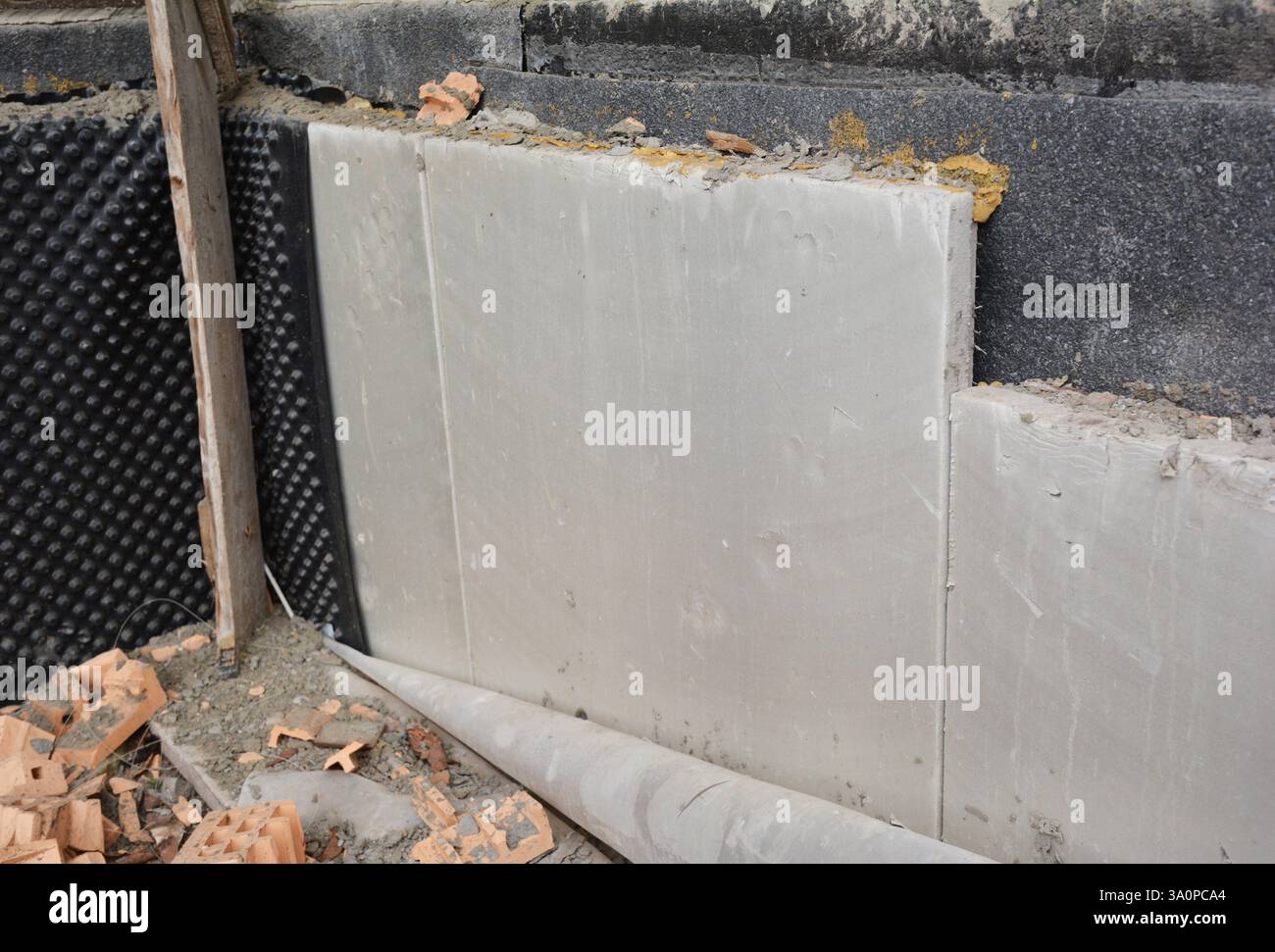 House foundation wall insulation layers with styrofoam boards and ...