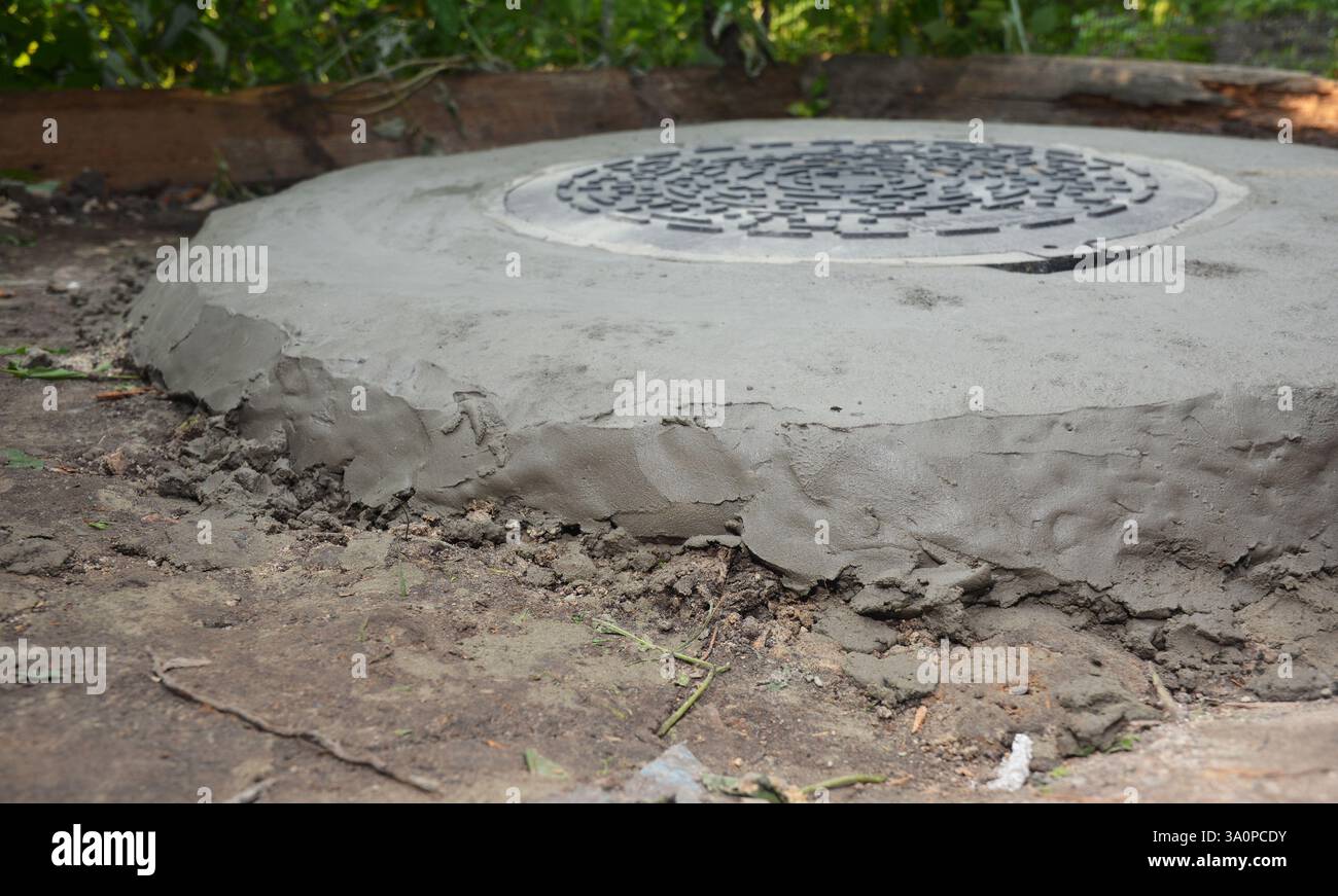 New septic tank hole. Sewer tank hole installation for house outdoors ...