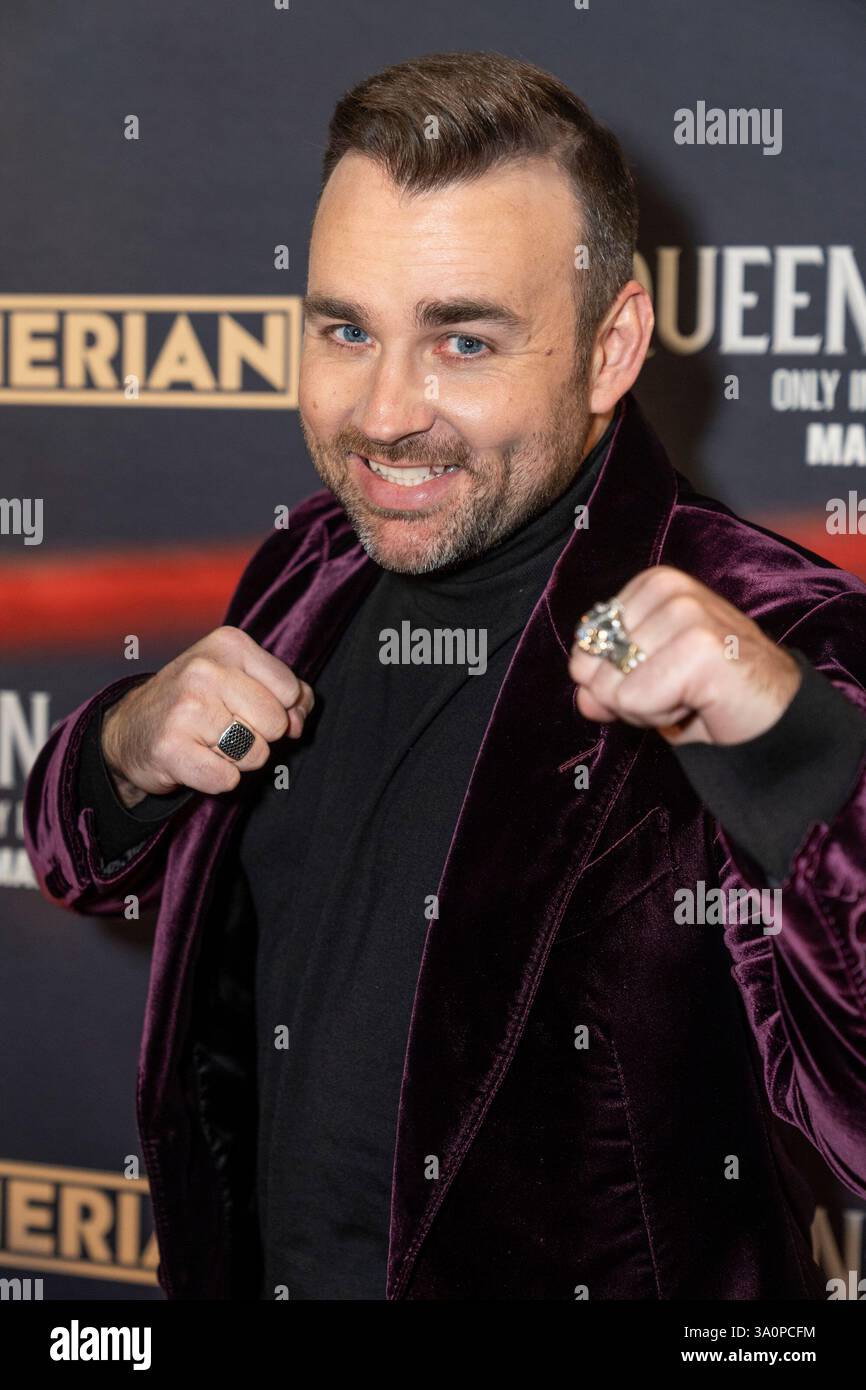 Ash Avildsen wearing suit by Tom Ford attends premiere of 'Queen of the ...