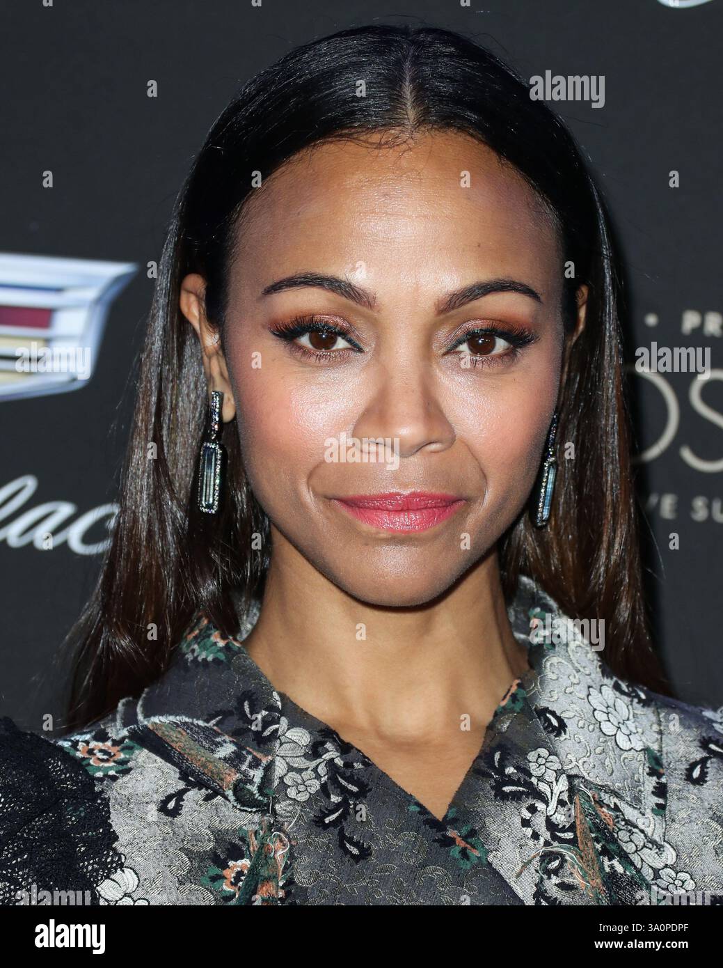(FILE) Zoe Saldana wins Oscar for Best Actress In A Supporting Role for ...