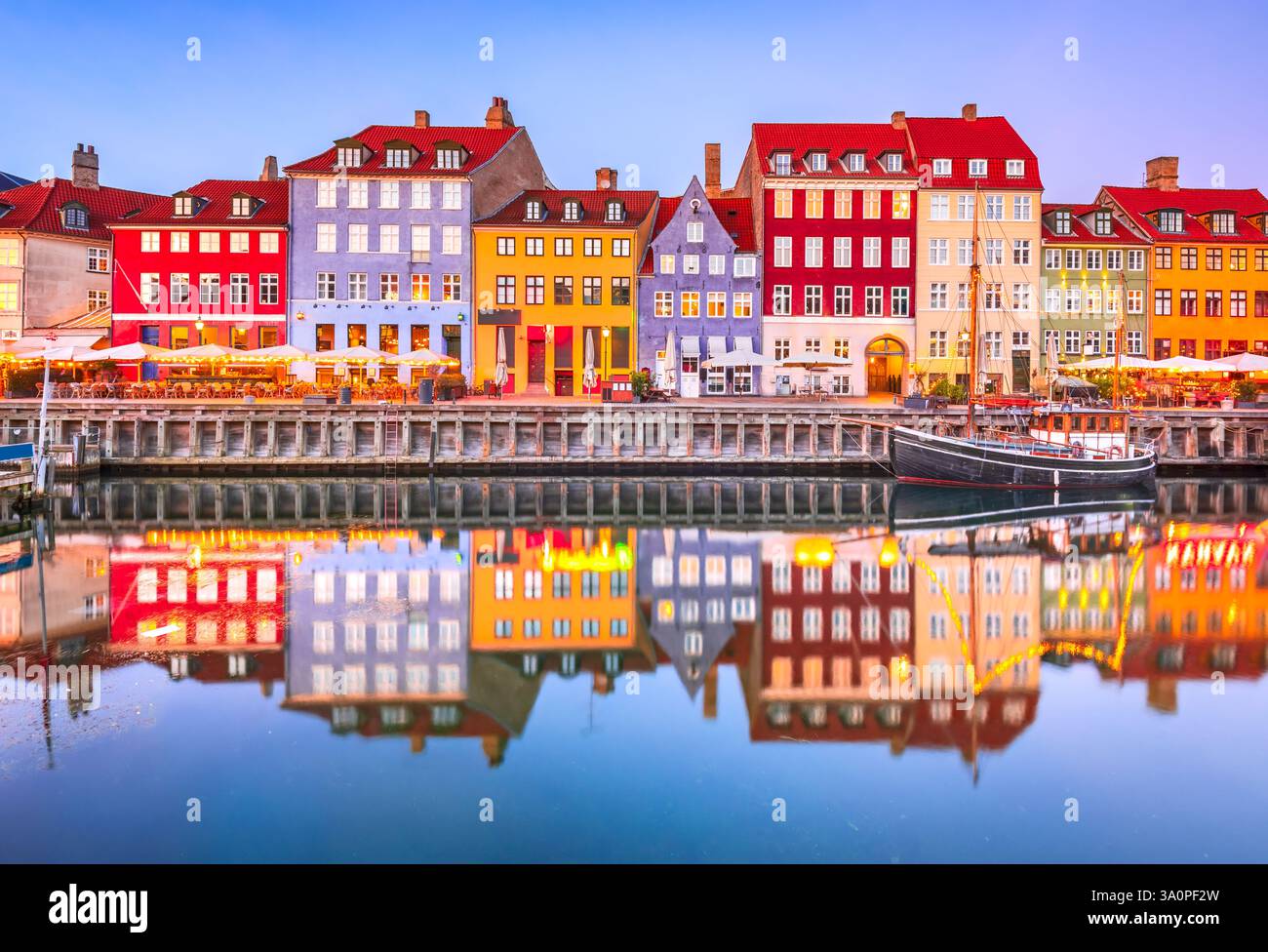 Copenhagen, Denmark. Nyhavn iconic canal, colorful morning twilight ...