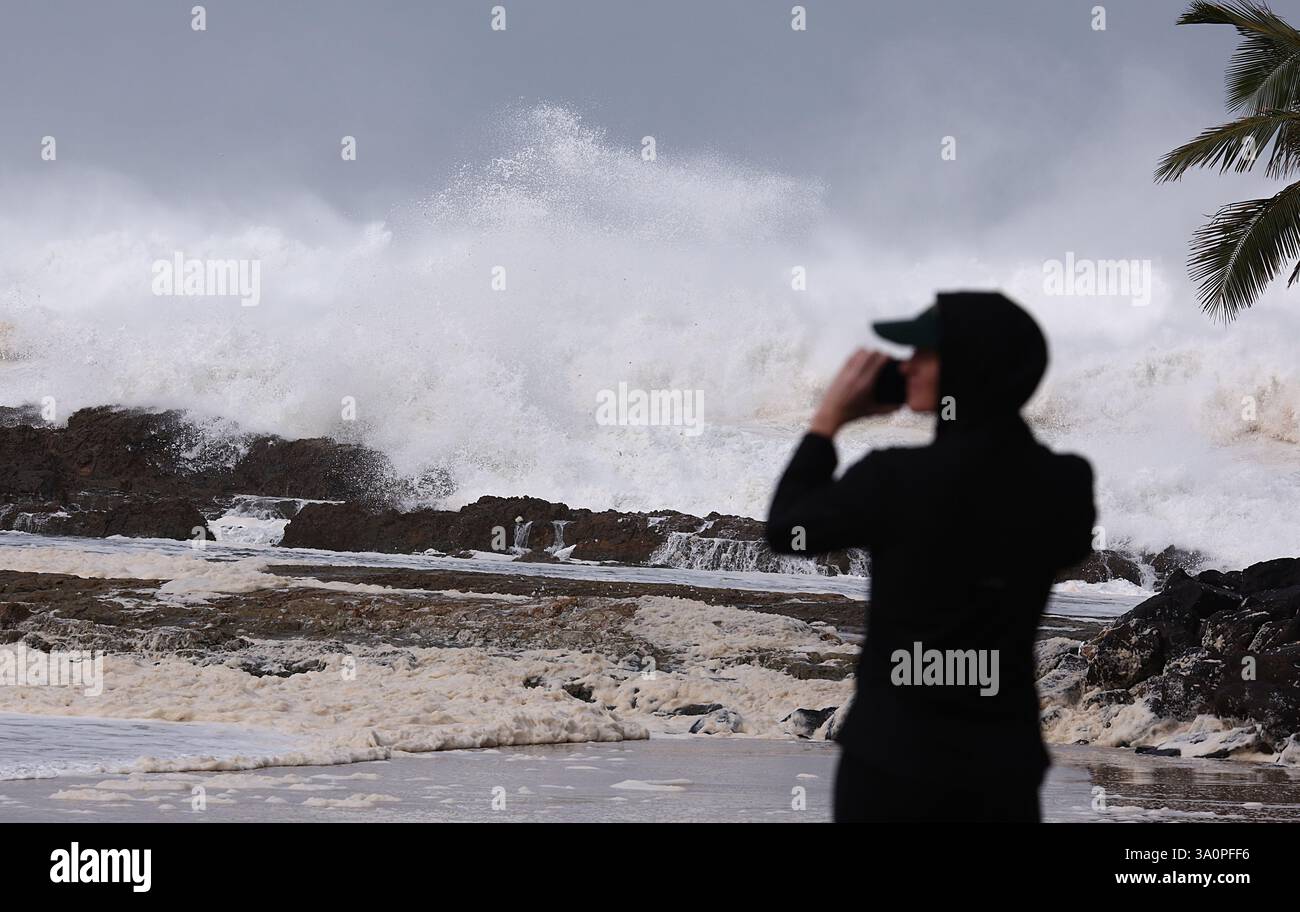 People are seen at Snapper Rocks on the Gold Coast, Queensland ...