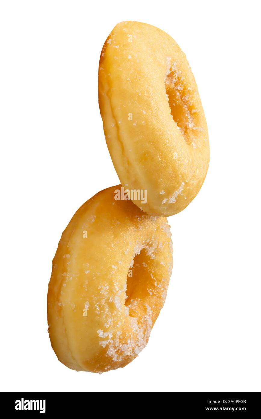 Side view of brown sugar glazed cinnamon donuts in stack is isolated on ...