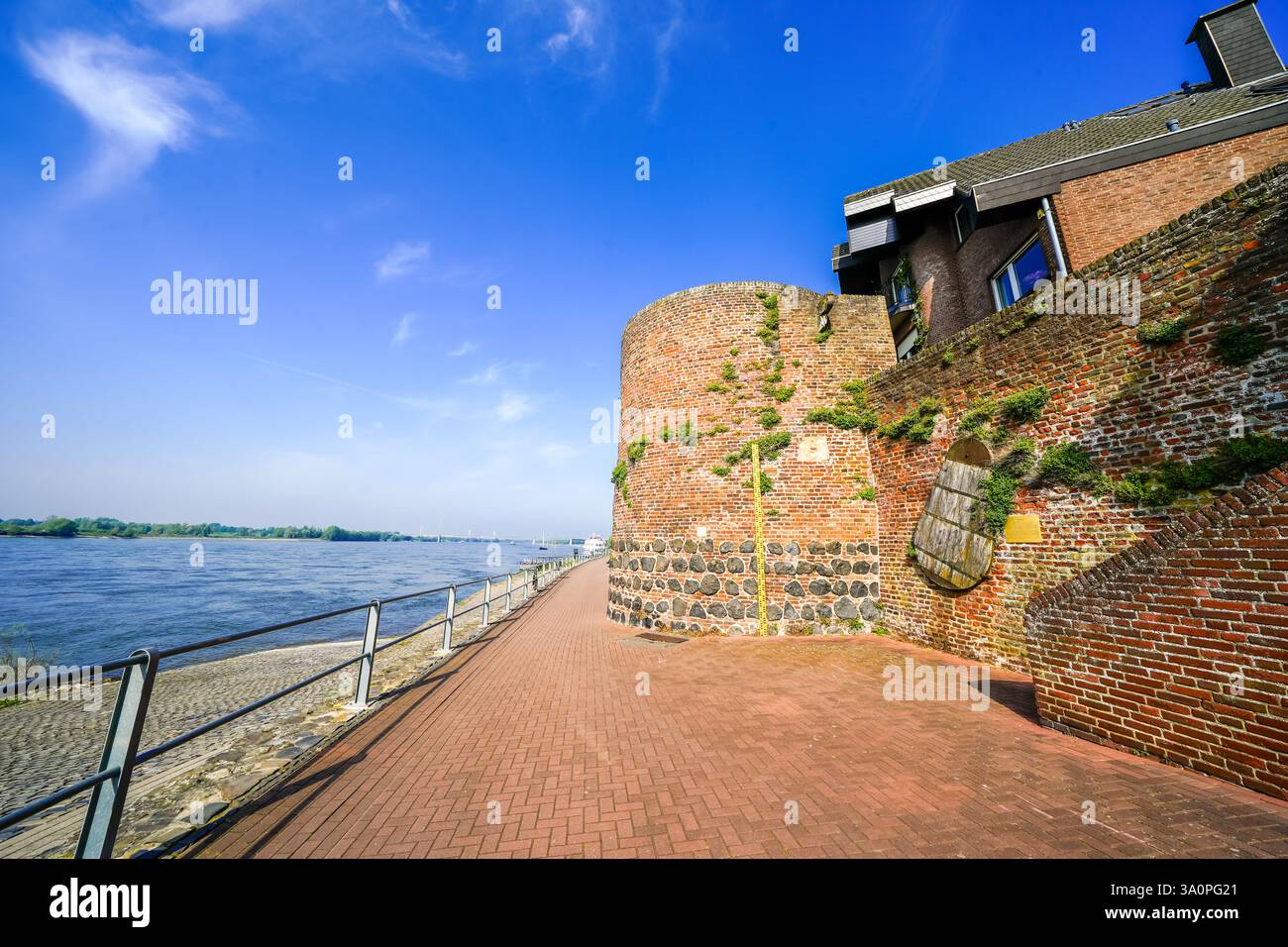 View of nature and the promenade in Rees. City on the Rhine with the ...
