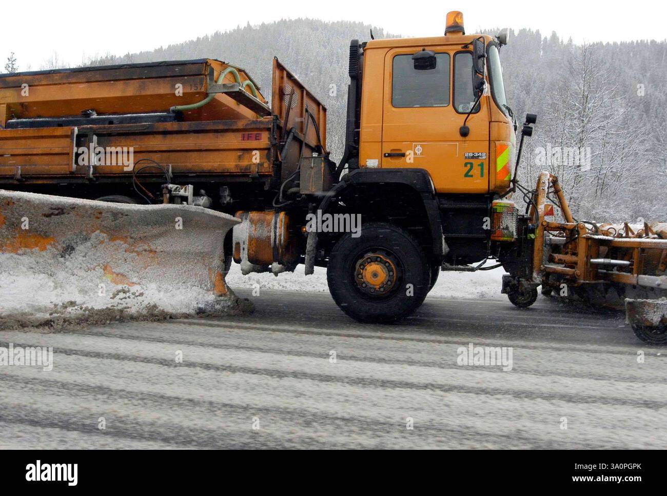 a snow plow removing snow on the highway in winter snow plow on the ...