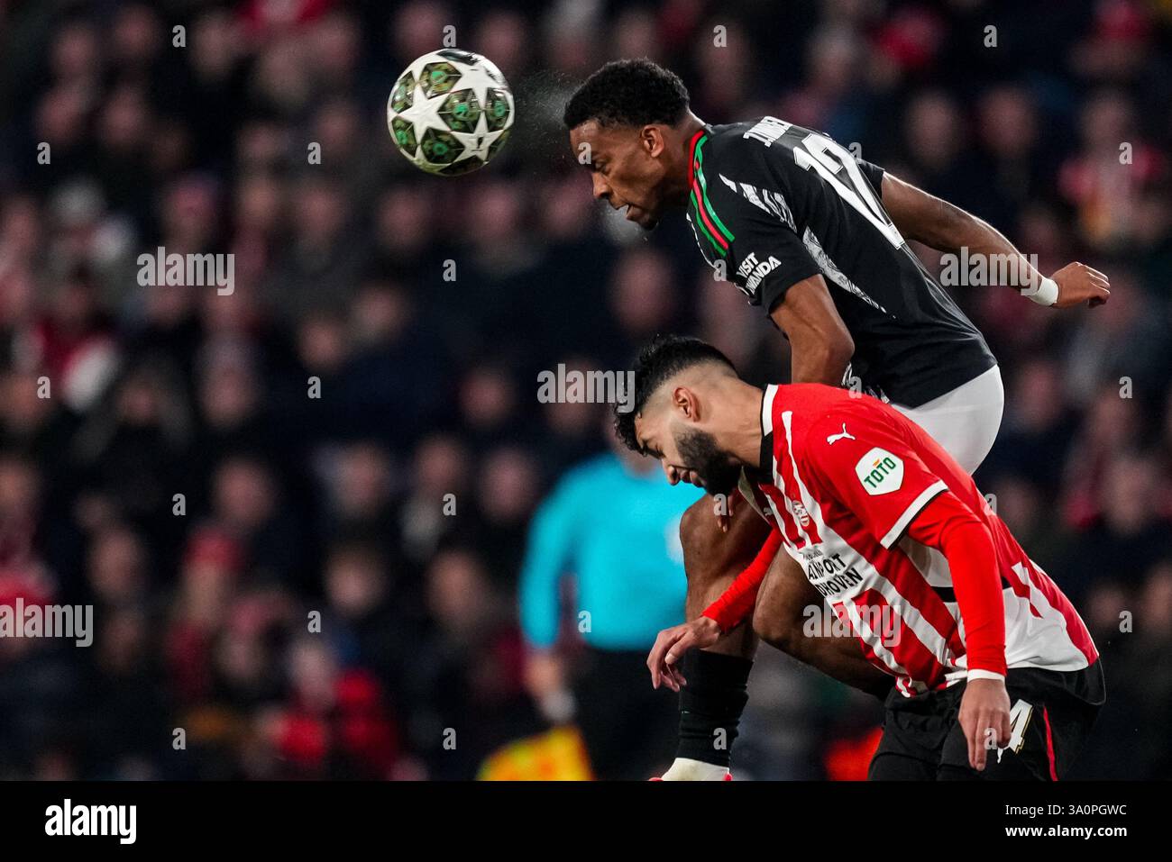 EINDHOVEN, NETHERLANDS - MARCH 4: Jurrien Timber of Arsenal and Ismael ...