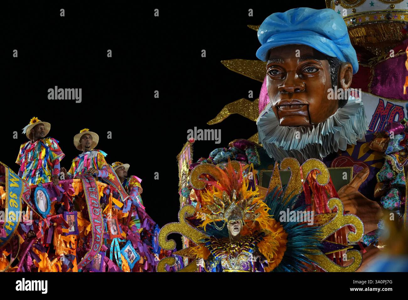 Performers from the Portela samba school parade on a float during ...