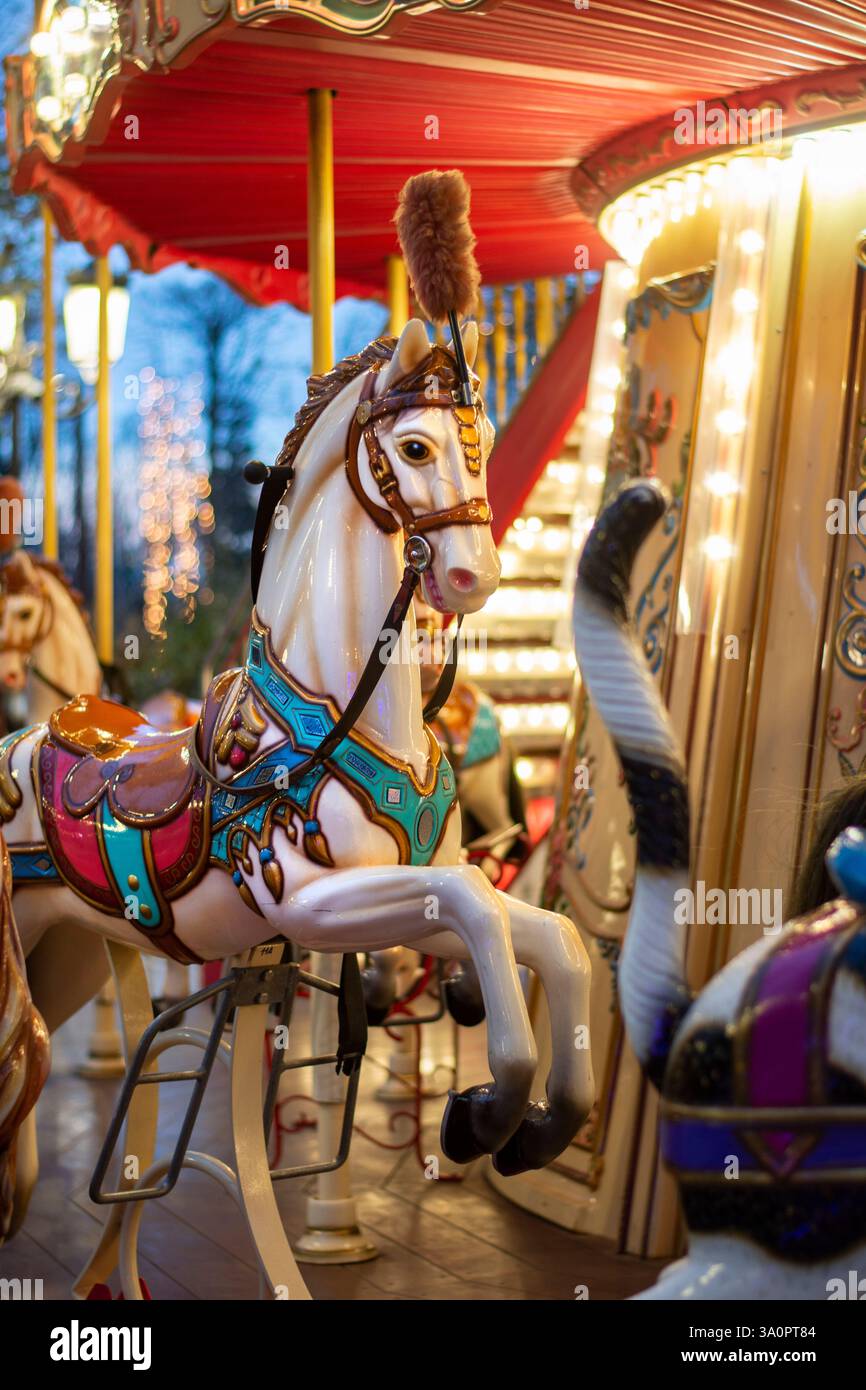 Roundabout horses evening hi-res stock photography and images - Alamy