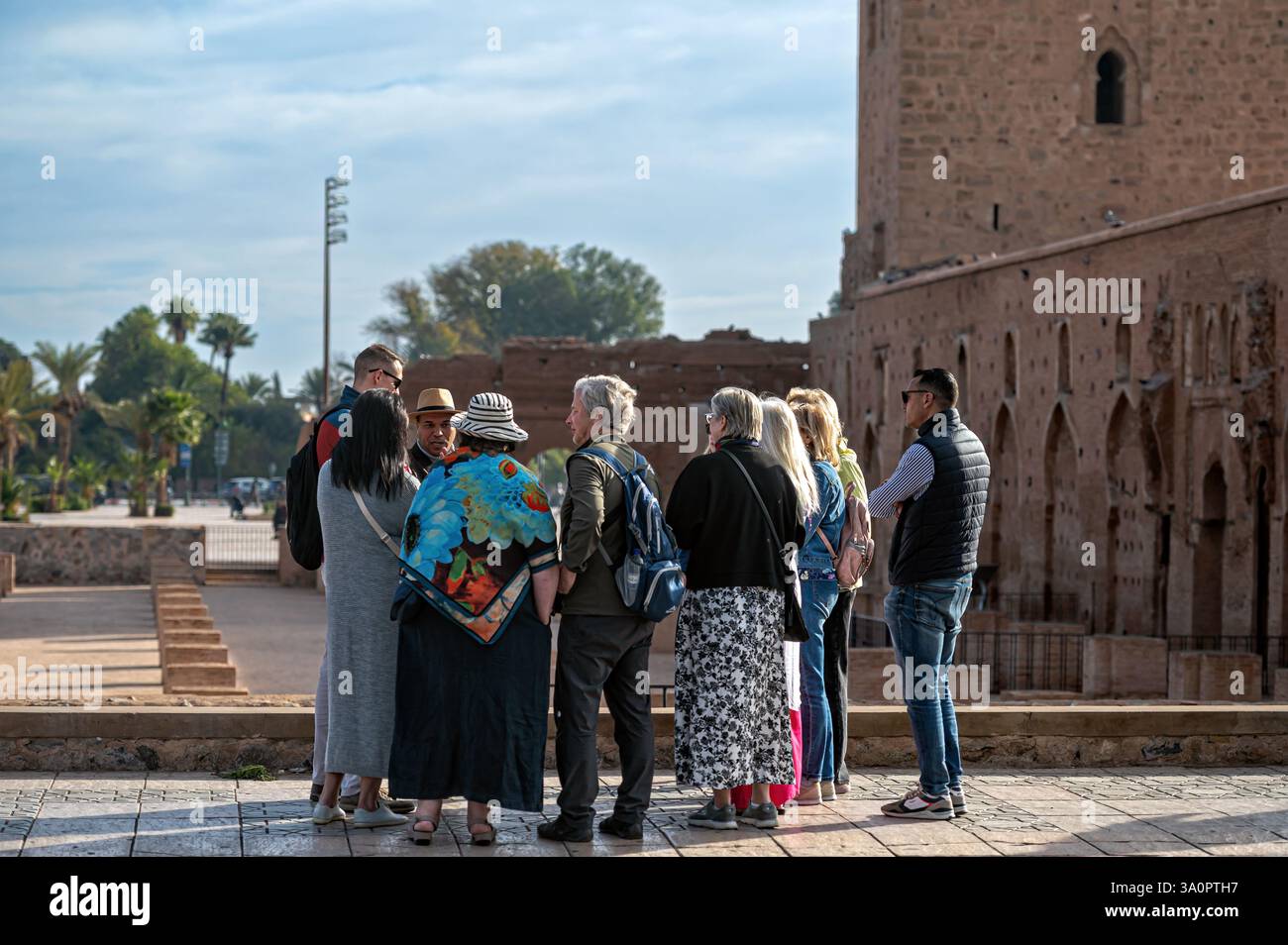Marrakech, Morocco - February 18, 2025: Groups of tourists gather near ...