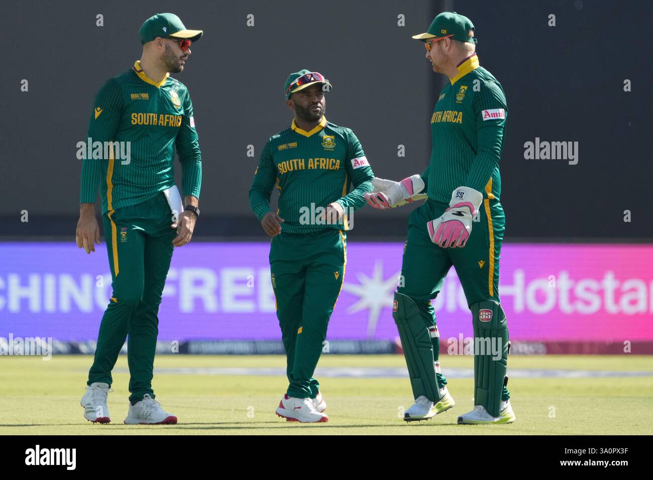 South Africa's captain Temba Bavuma, center, speaks to his teammates ...