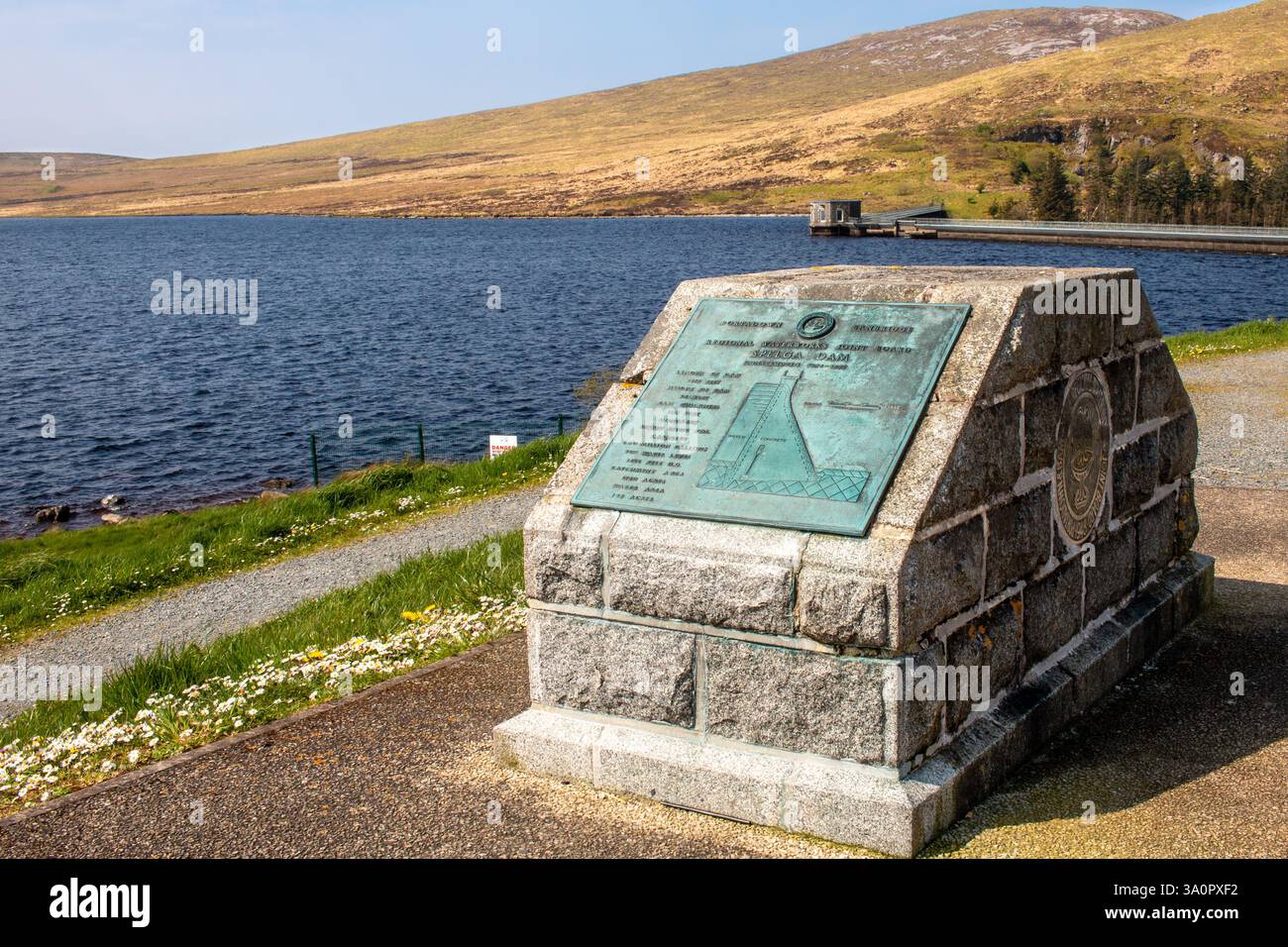 A plaque with information about the structure of the dam and how it was ...
