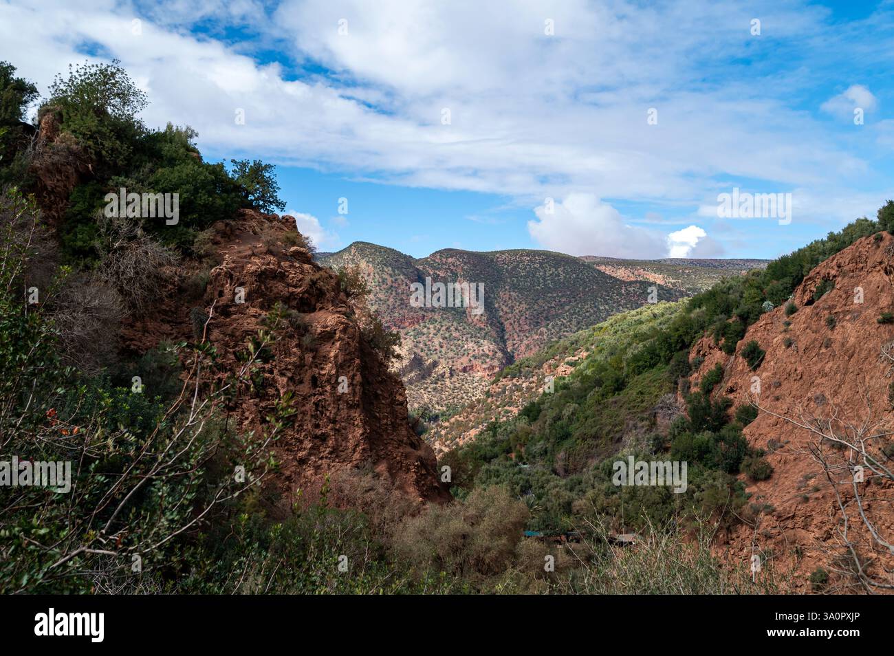 Enjoy a serene view of Morocco’s vibrant mountains and lush greenery ...