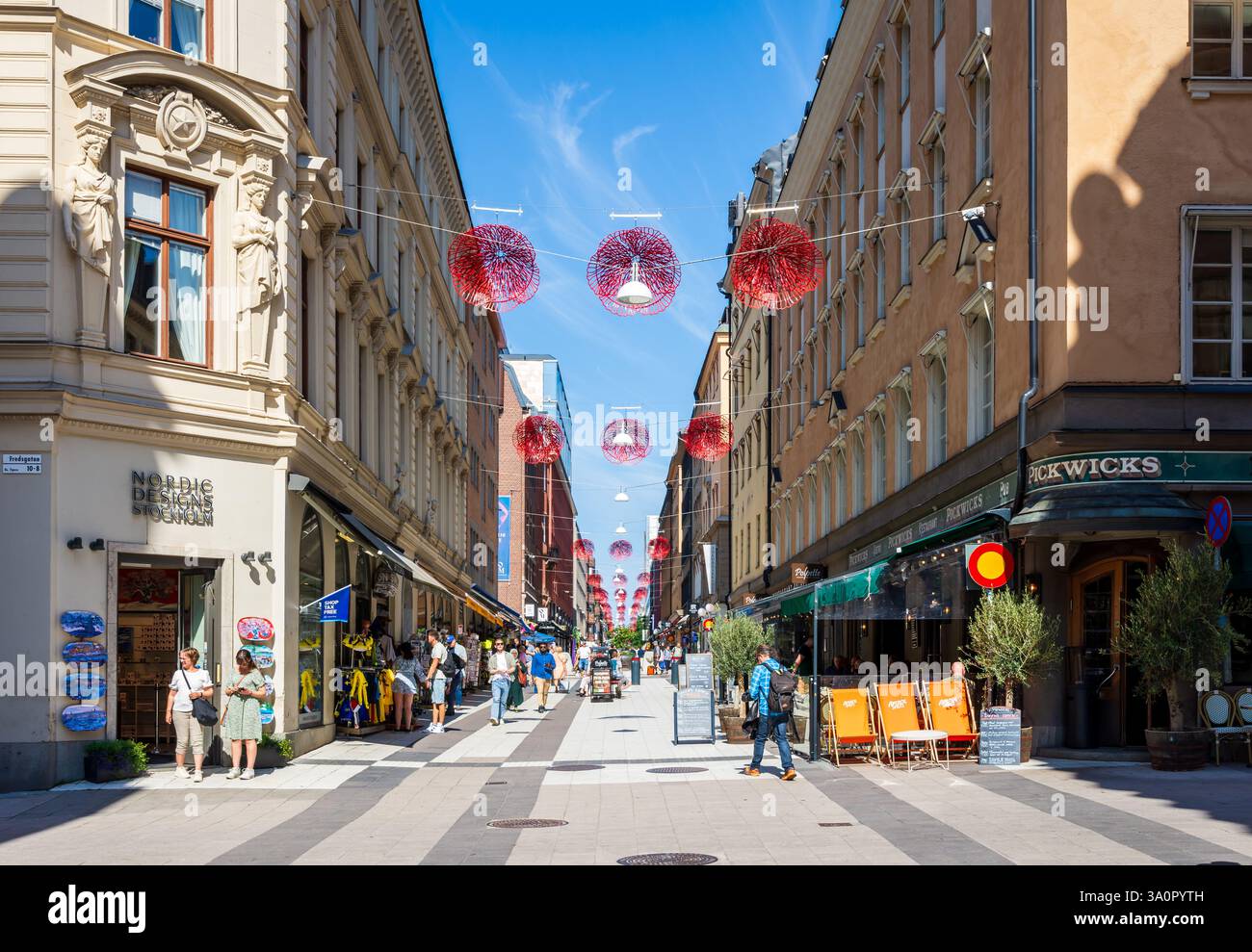 People go shopping in the Drottninggatan (Queen Street) in Stockholm ...