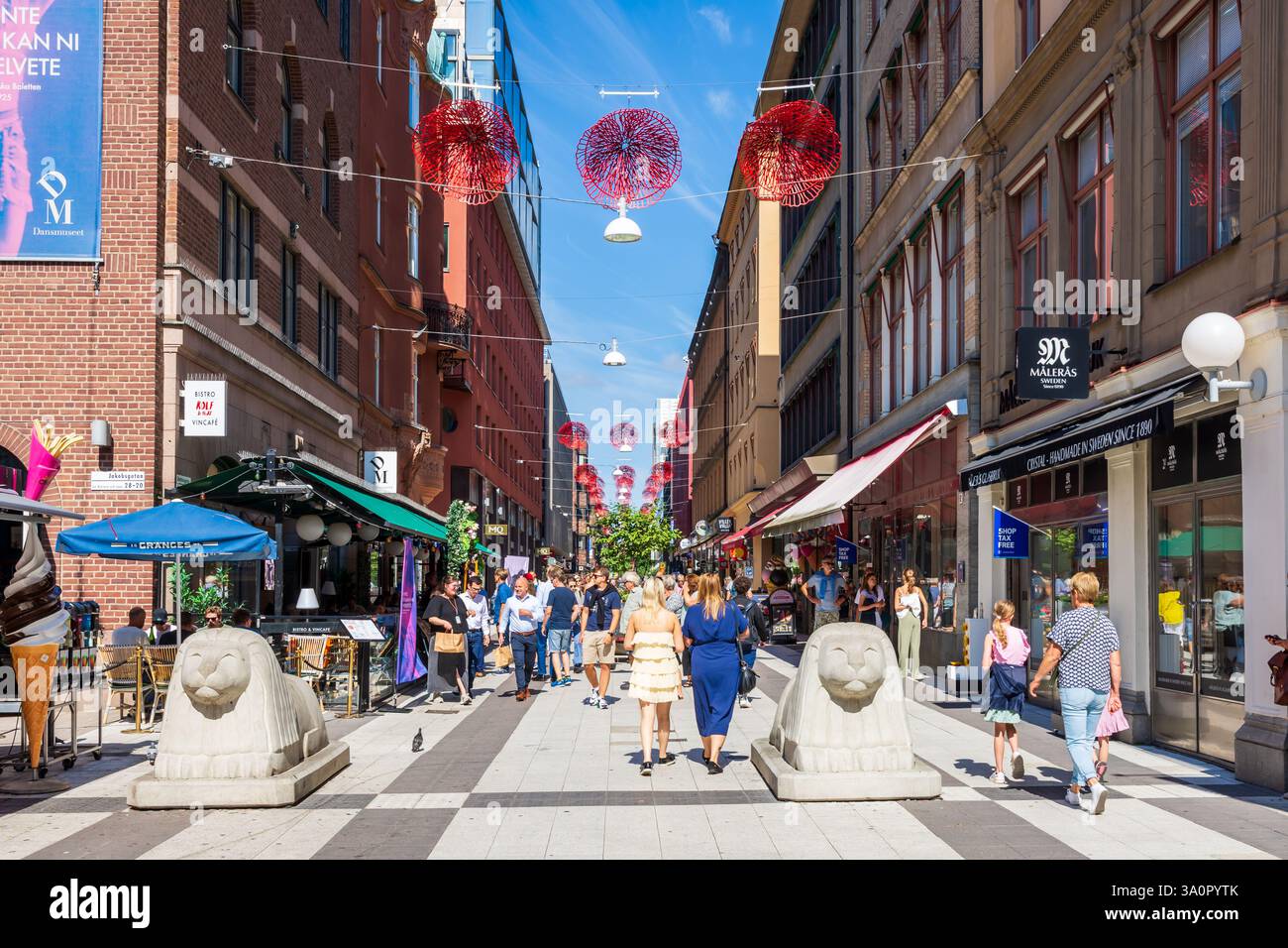 People go shopping in the Drottninggatan (Queen Street) in Stockholm ...