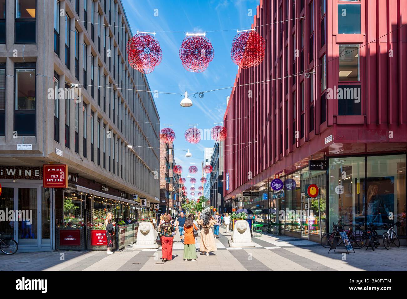 People go shopping in the Drottninggatan (Queen Street) in Stockholm ...