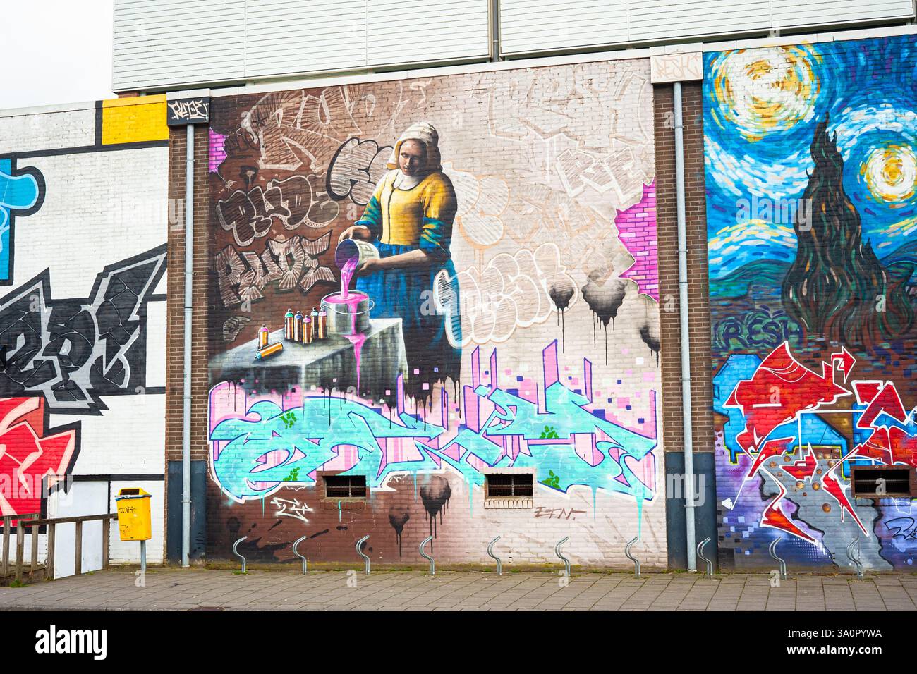 Graffiti depicting The Milkmaid by Johannes Vermeer. Wall Art made by ...