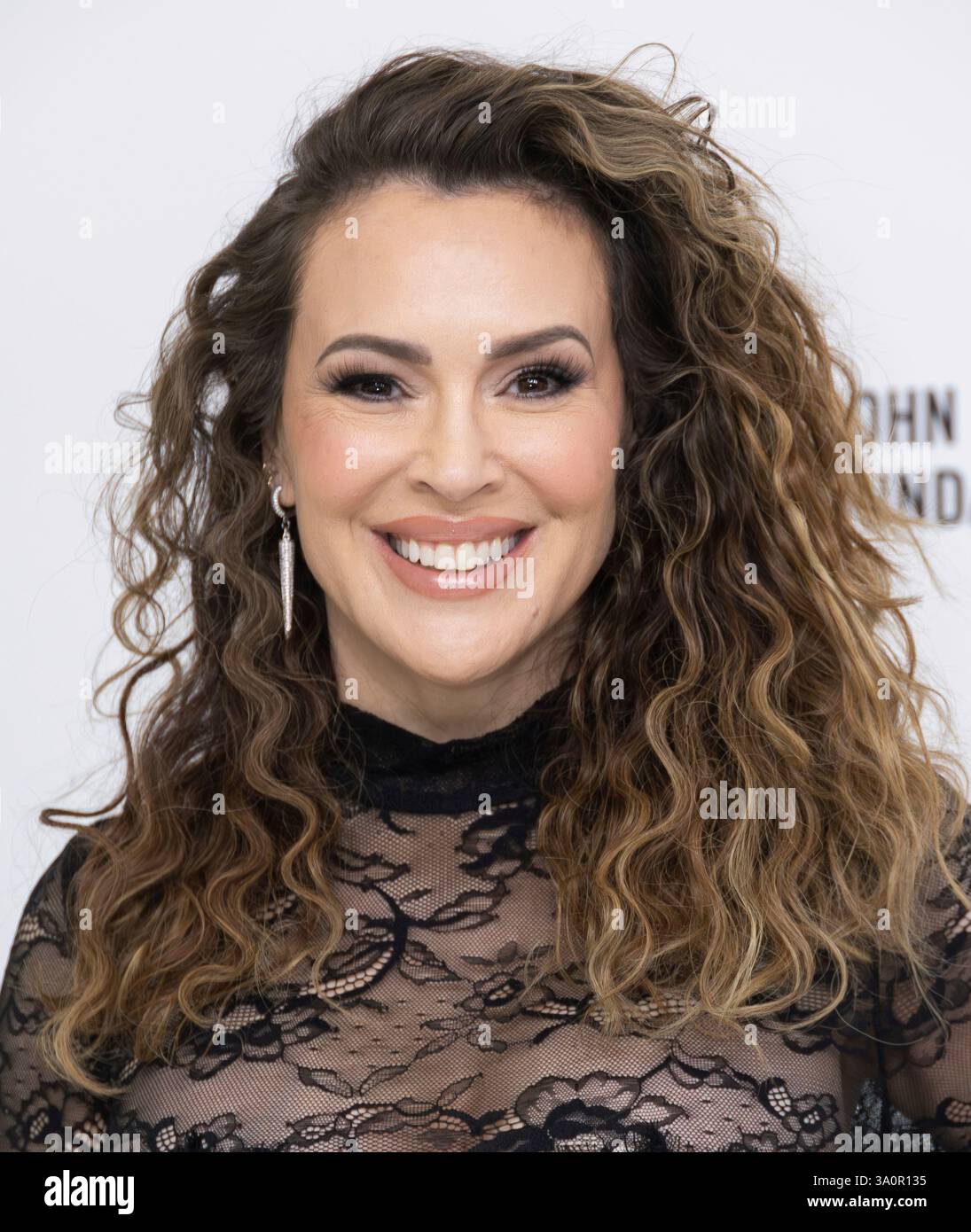 Alyssa Milano arrives at the 33rd Annual Elton John AIDS Foundation Academy Awards Viewing Party ...