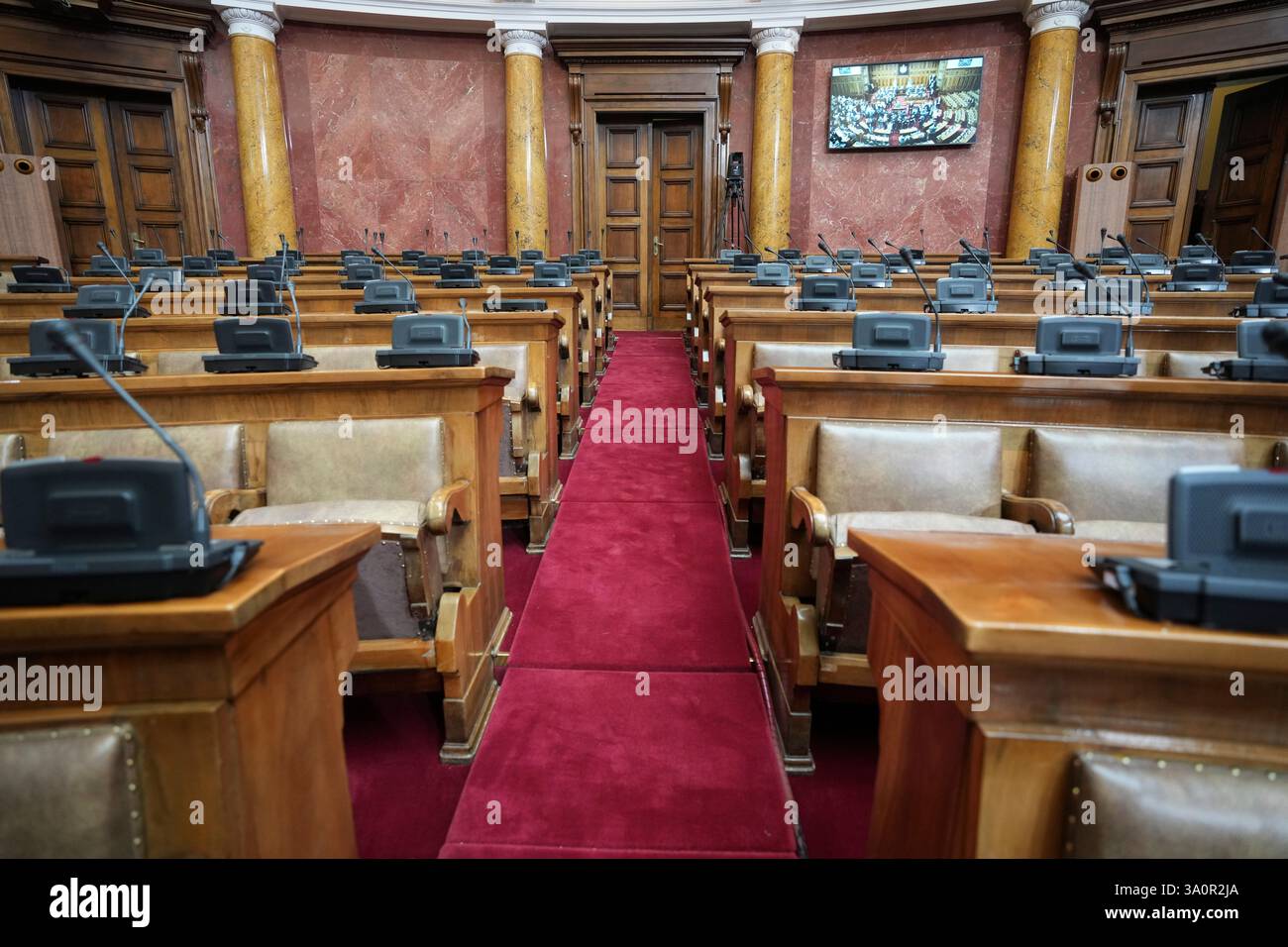 Empty seats of opposition are seen on the parliament floor during a ...