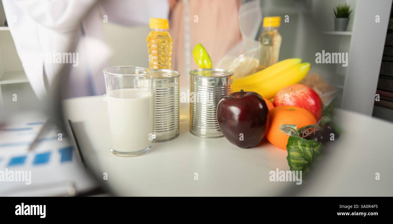 Nutritional evaluation. A nutritionist highlighting food items during a ...