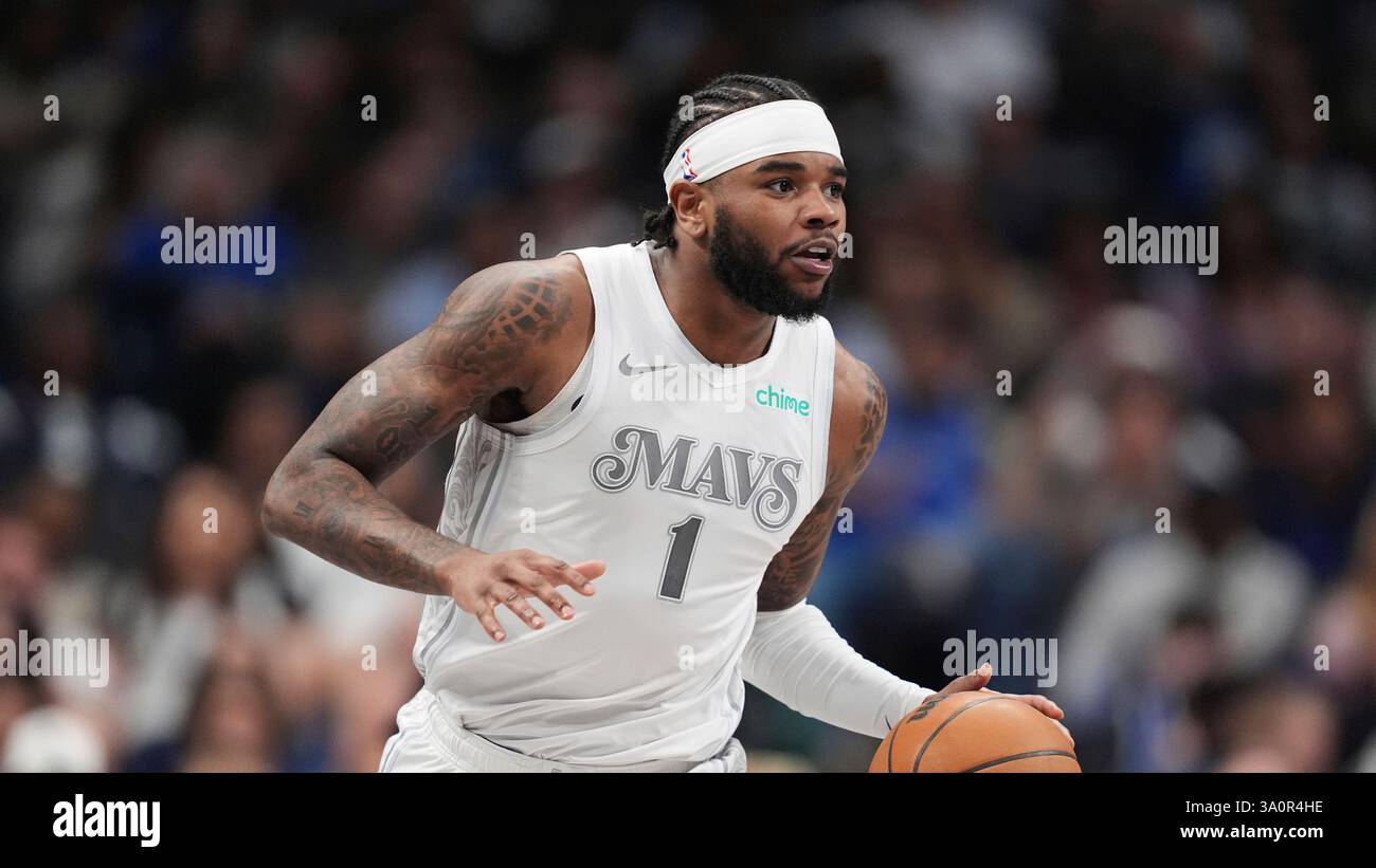 Dallas Mavericks guard Jaden Hardy advances the ball upcourt against ...