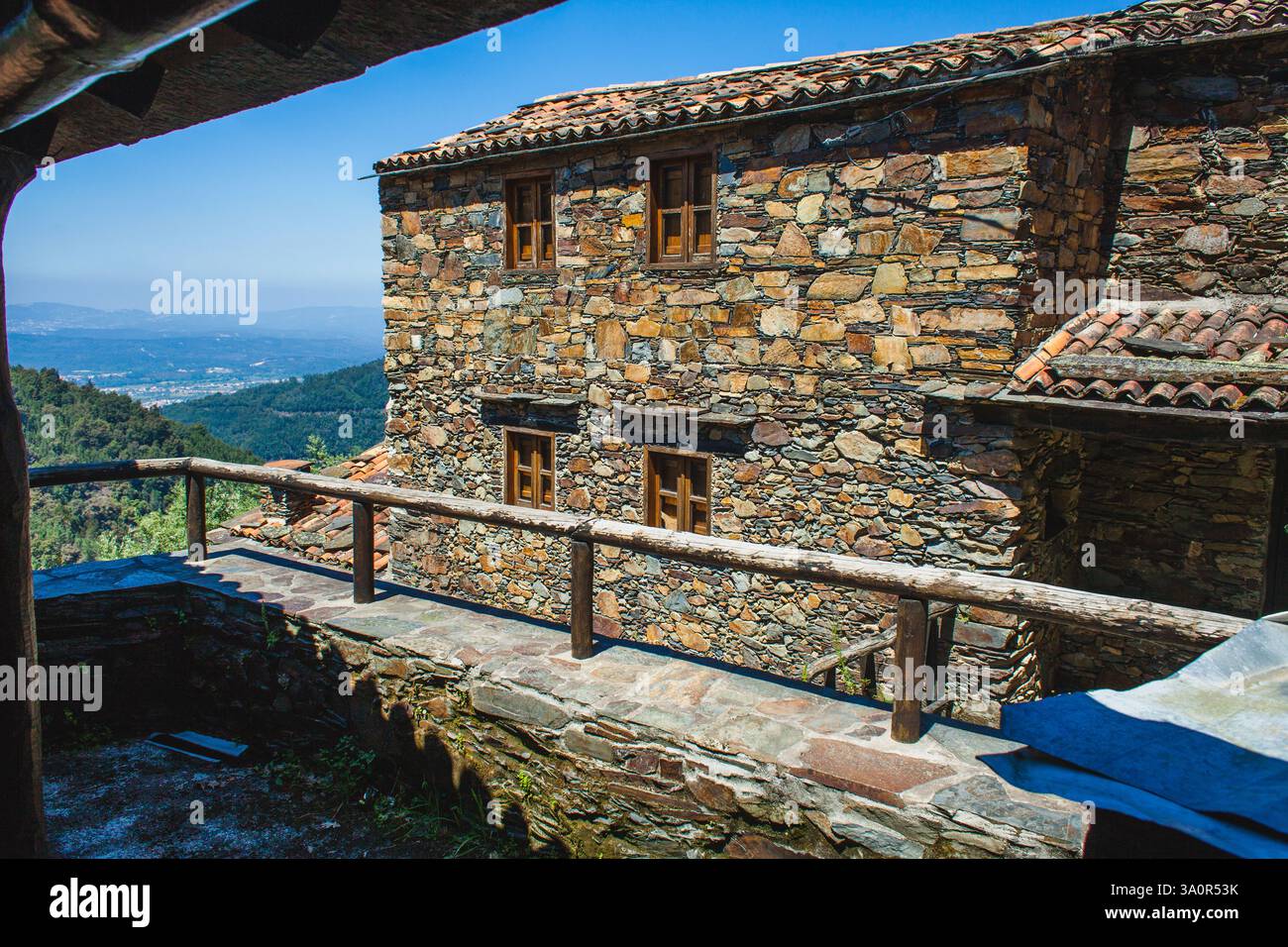 A courtyard of an old flagstone house in Portugal Stock Photo - Alamy