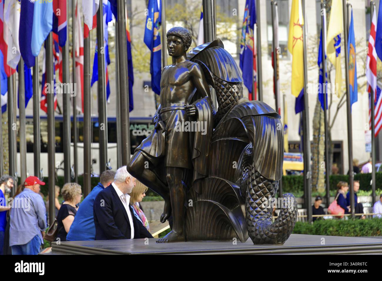 Rockefeller Center, bronze sculpture of a standing man in front of ...