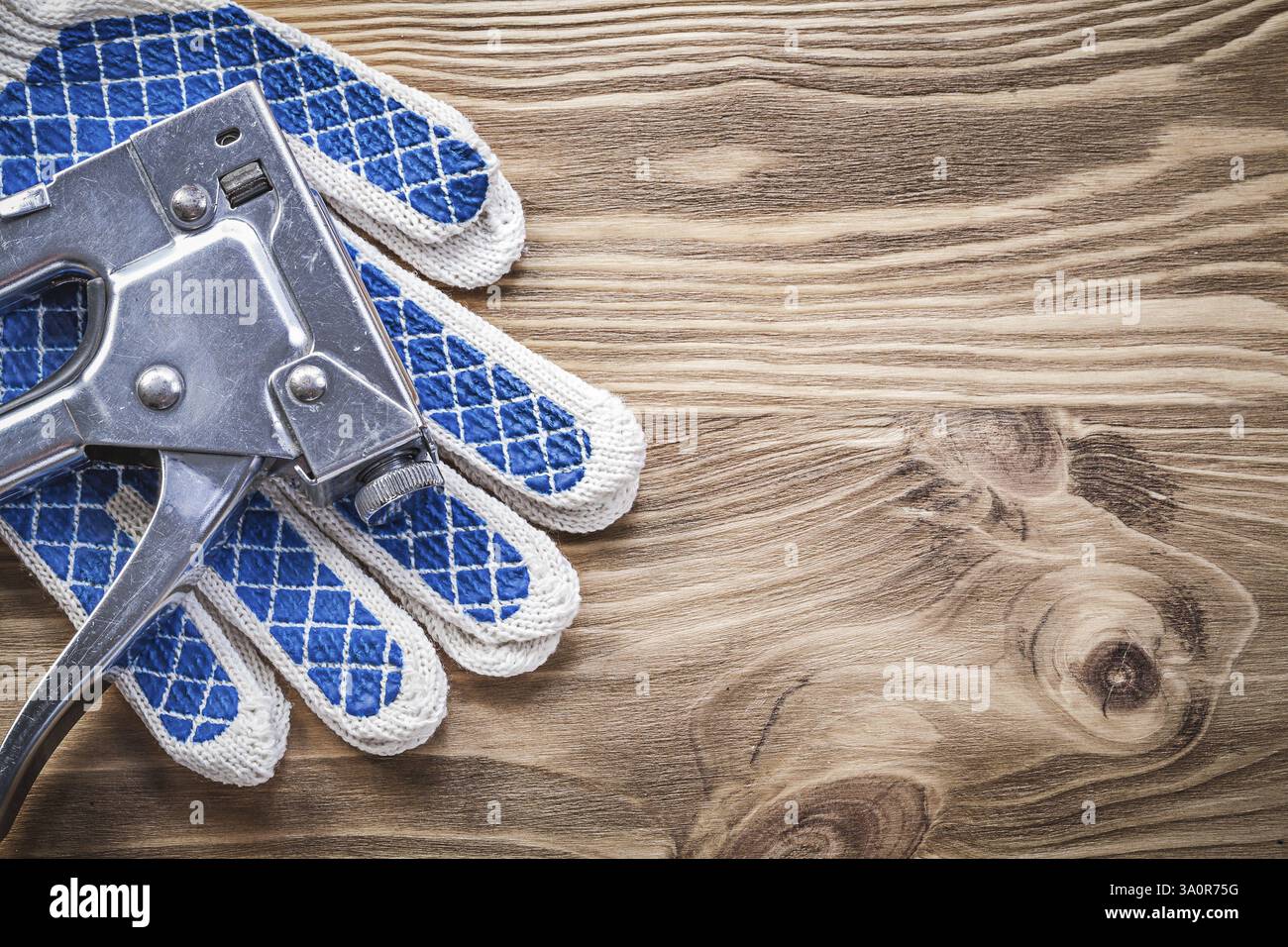 Staple gun safety gloves hi-res stock photography and images - Alamy