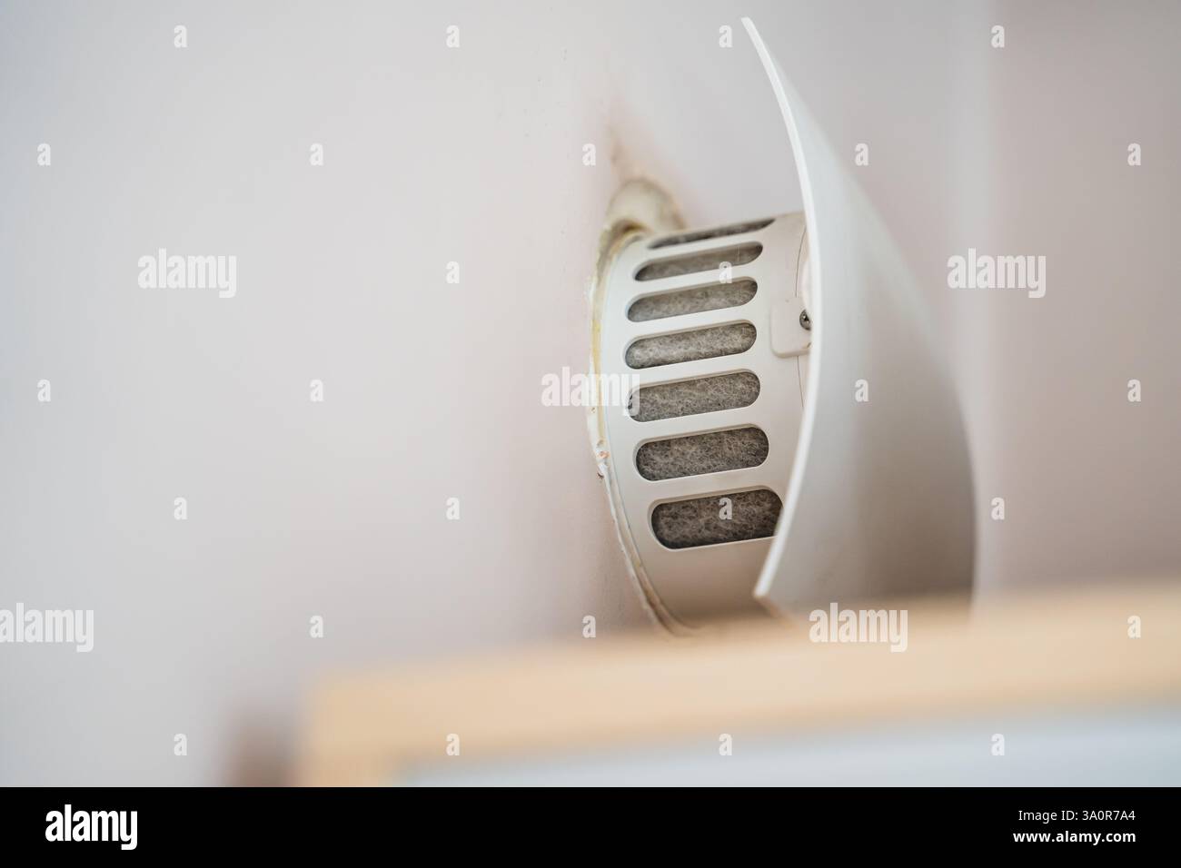 Hole in the wall with adjustable opening and filtration. Permanent ...