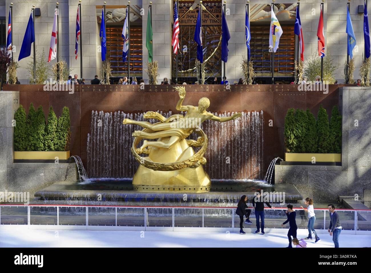 Sculpture of Prometheus in the middle of a fountain in front of an ice ...