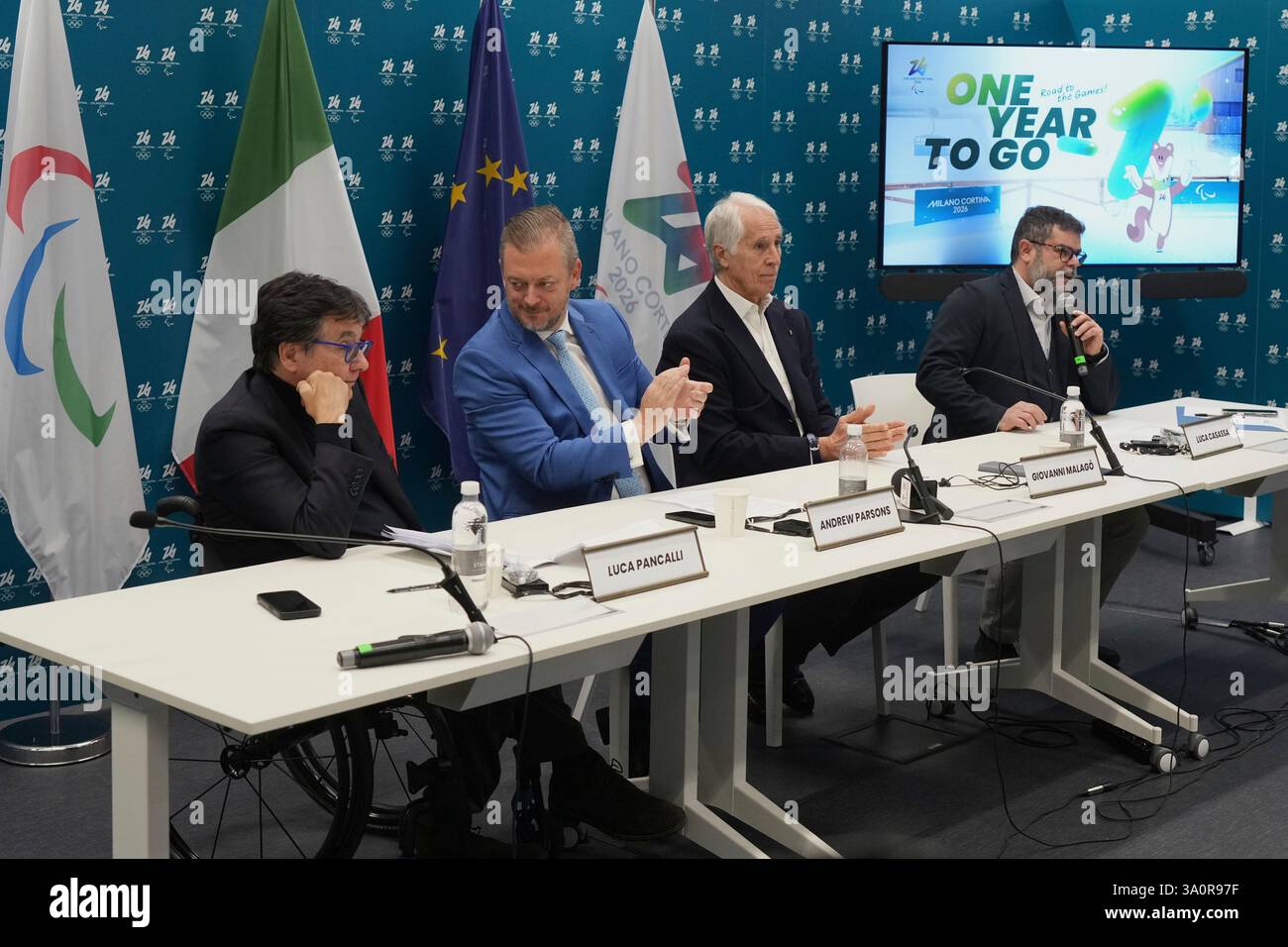 From left: Italian Paralympic Commitee President Luca Pancalli ...