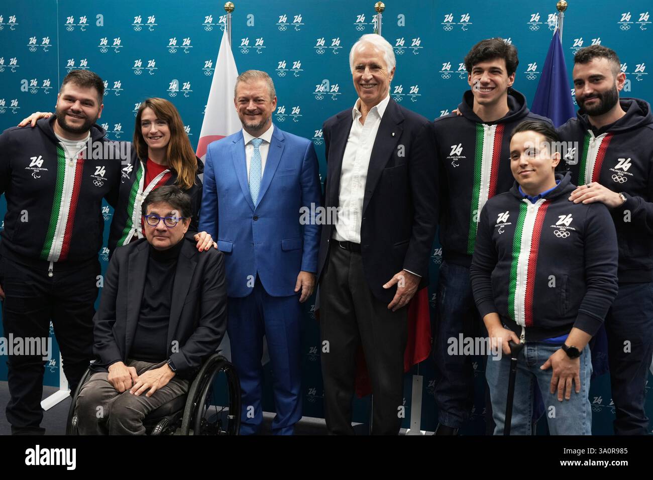 Italian Paralympic Commitee President Luca Pancalli, second left ...