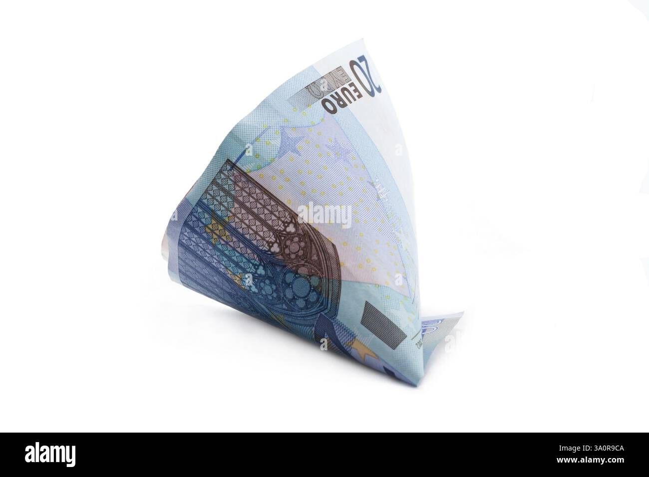 Bills euro rolled up insulated on white background Stock Photo - Alamy