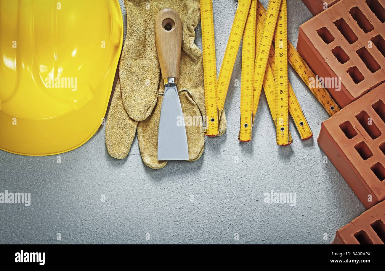 Collection of bricklaying tools on concrete background construction ...