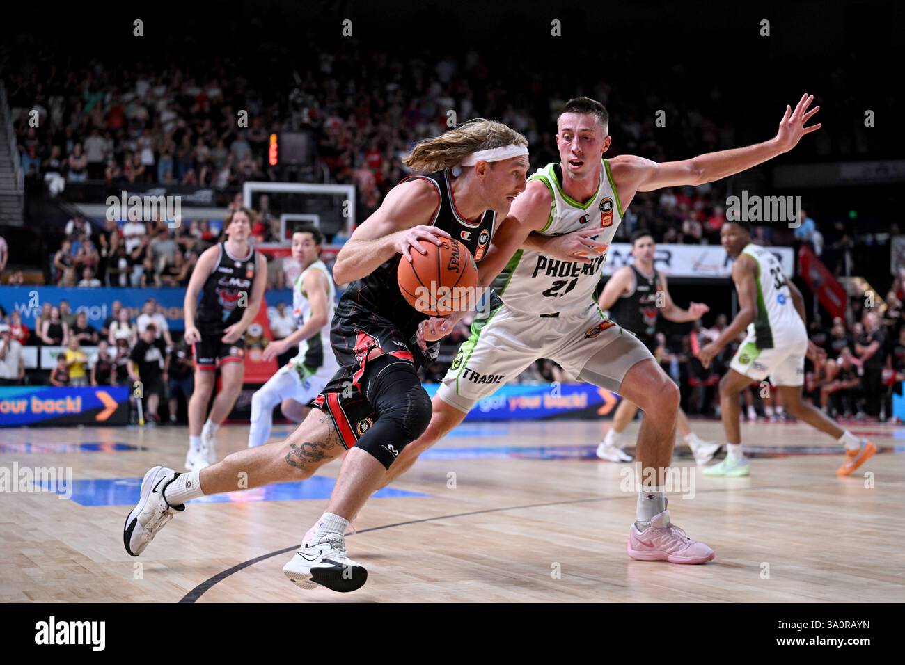 Daniel Grida of the Hawks and Joe Wieskamp of the Phoenix during the ...