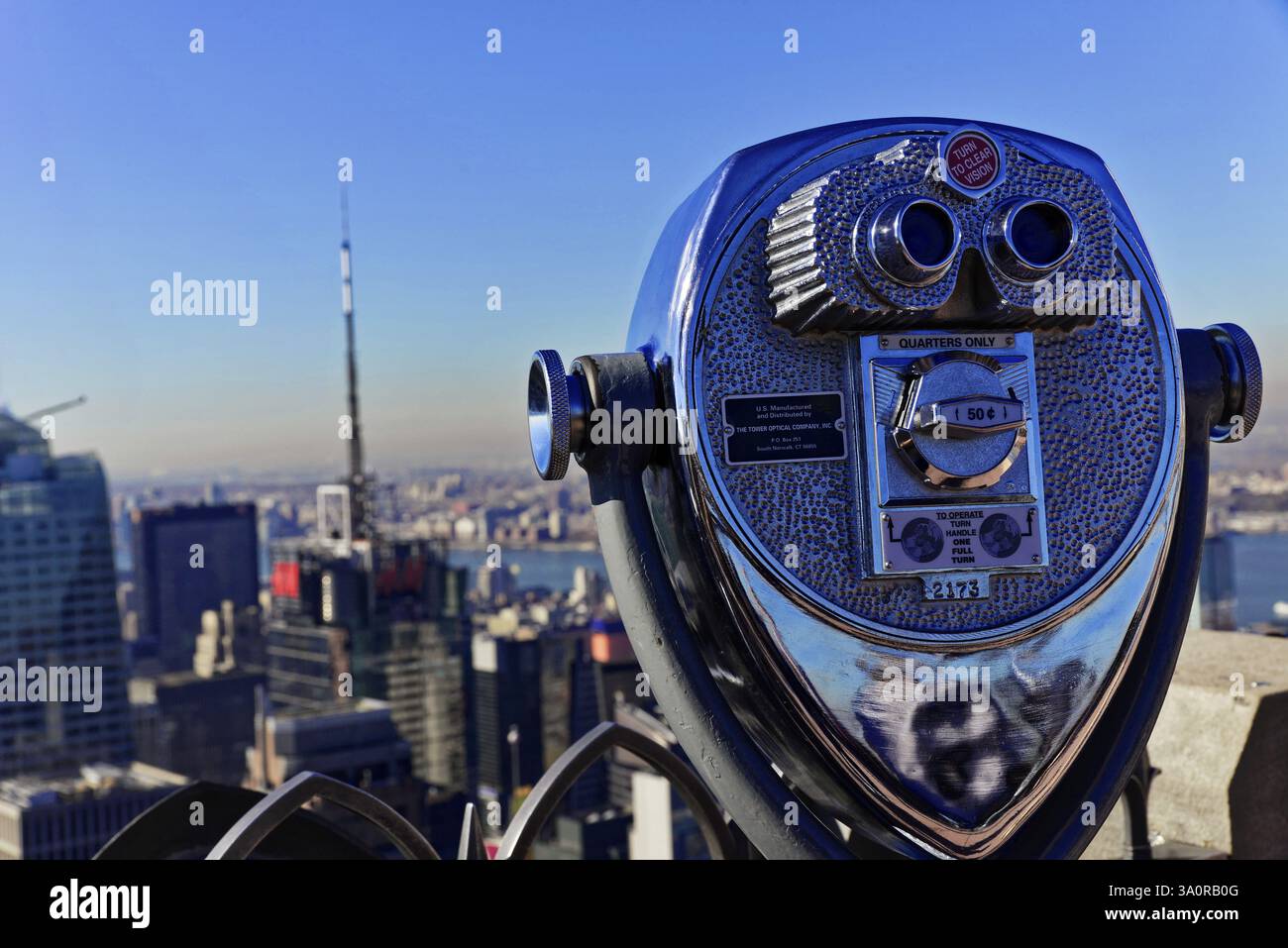 Observation deck of the Rockefeller Center, telescope on a viewing ...
