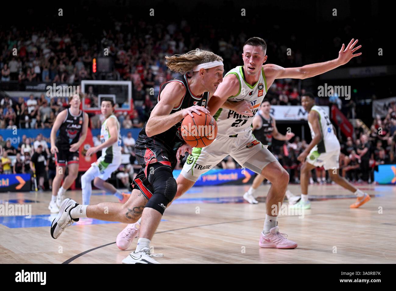 Daniel Grida of the Hawks and Joe Wieskamp of the Phoenix during the ...