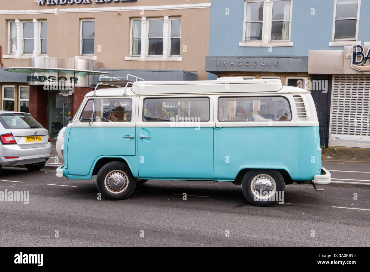 two tone light blue vintage classic volkswagen T2 camper bus parked in ...