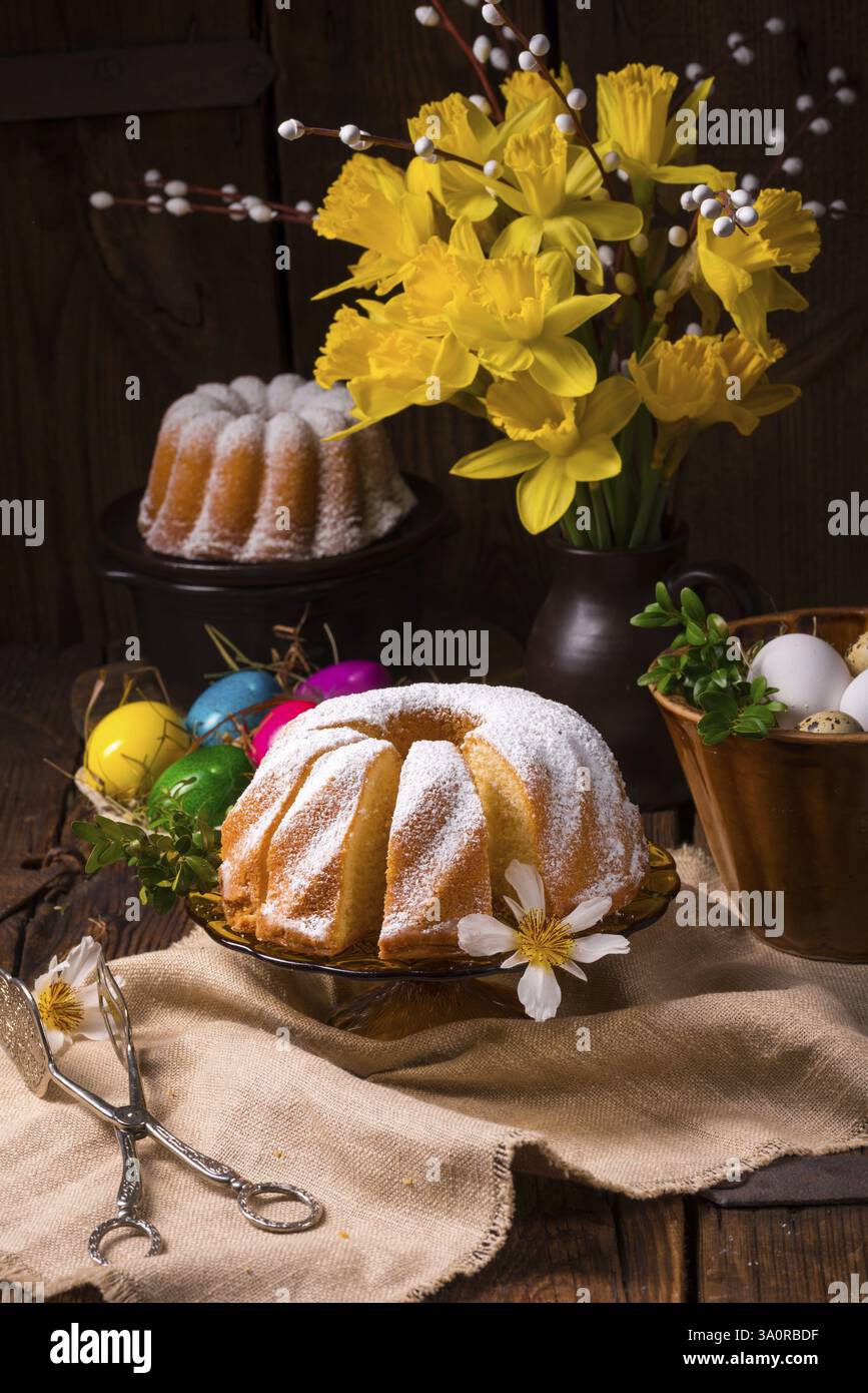 Easter eggs and daffodils Stock Photo - Alamy