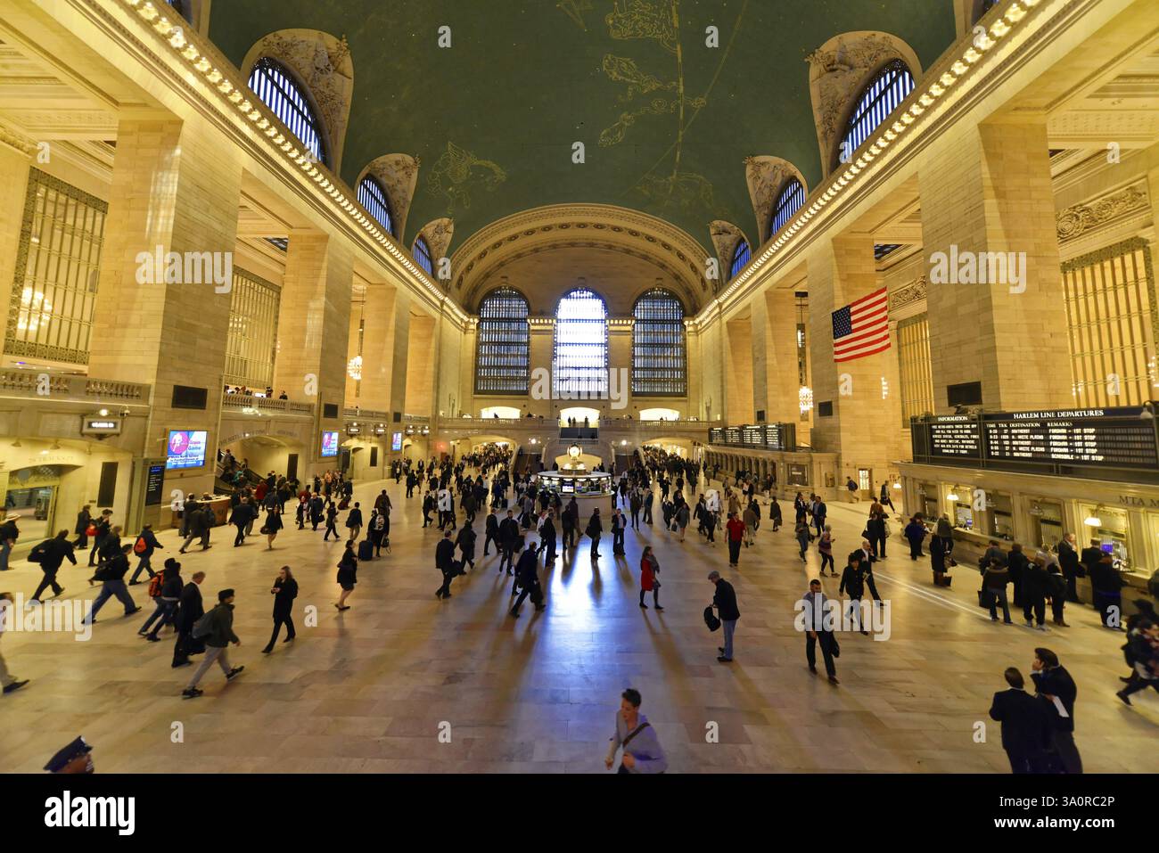 Grand Central Station bustling with people under an impressive ceiling ...