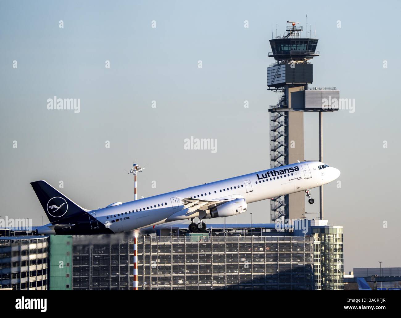 Lufthansa Airbus A321 aircraft taking off on the main runway south, 05R ...
