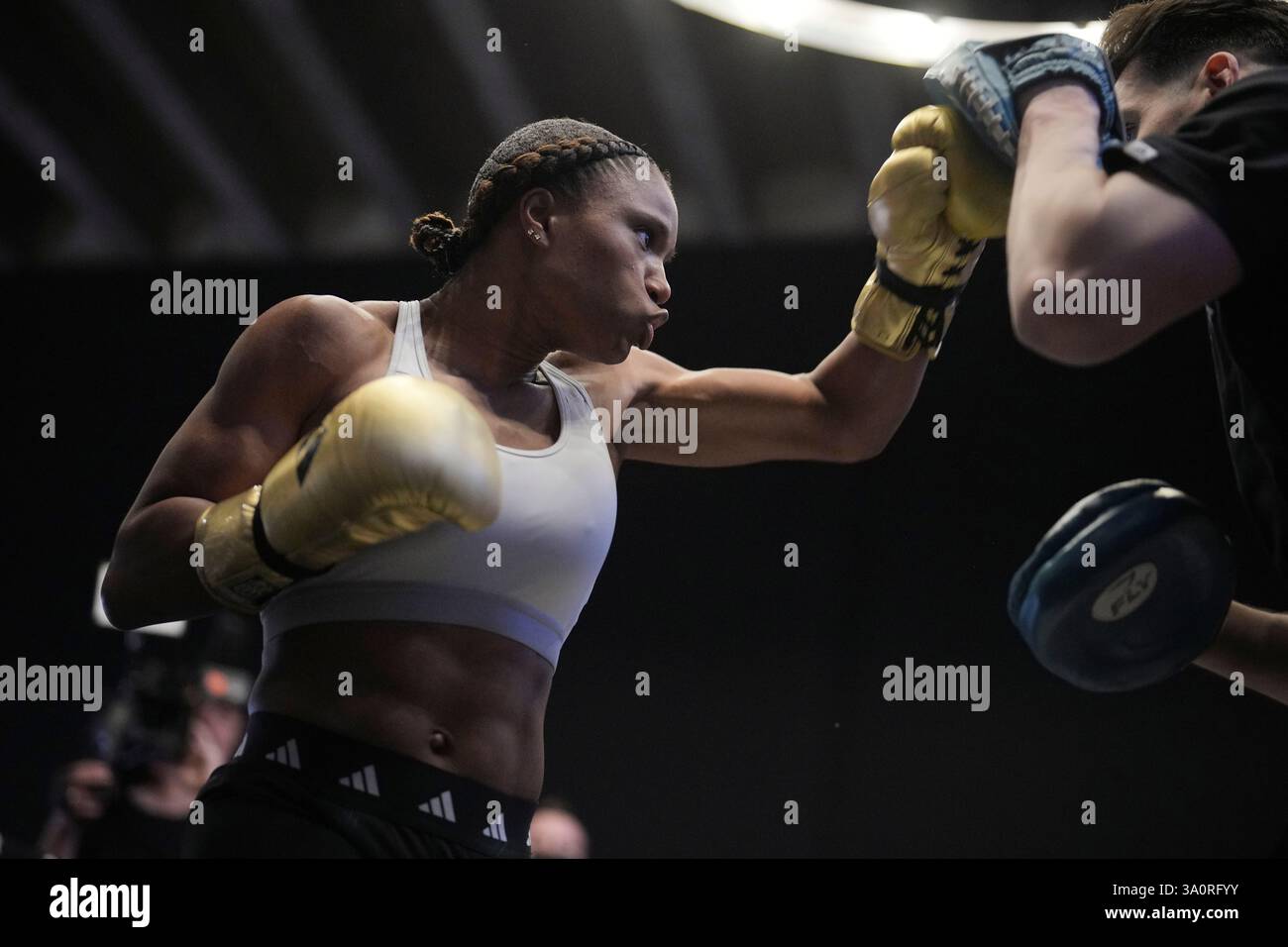 British boxer Caroline Dubois attends a boxing media workout in London ...