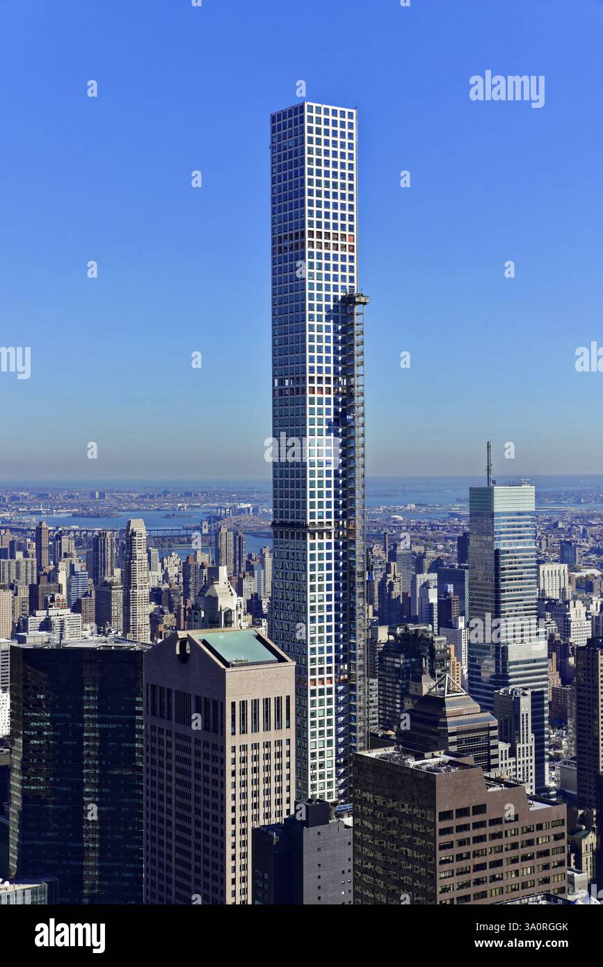 Rockefeller Center observation deck, A slender skyscraper rises high ...