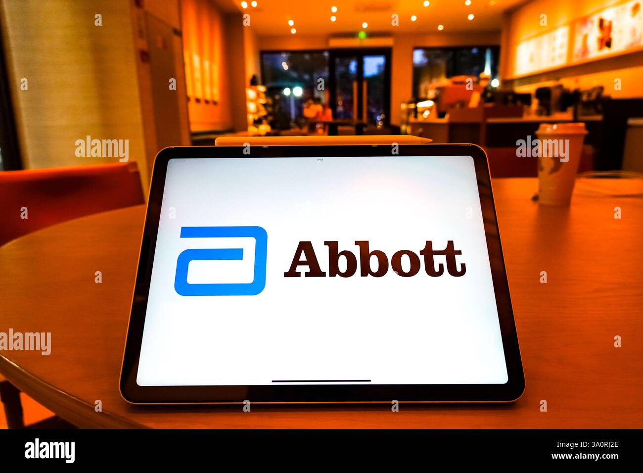 China. 02nd Mar, 2025. In this photo illustration, an Abbott Laboratories logo is displayed on ...