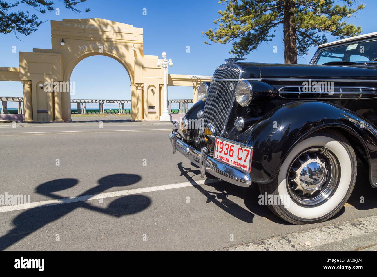 A 1936 Chrysler Airstream parked in front of the New Napier Arch in ...
